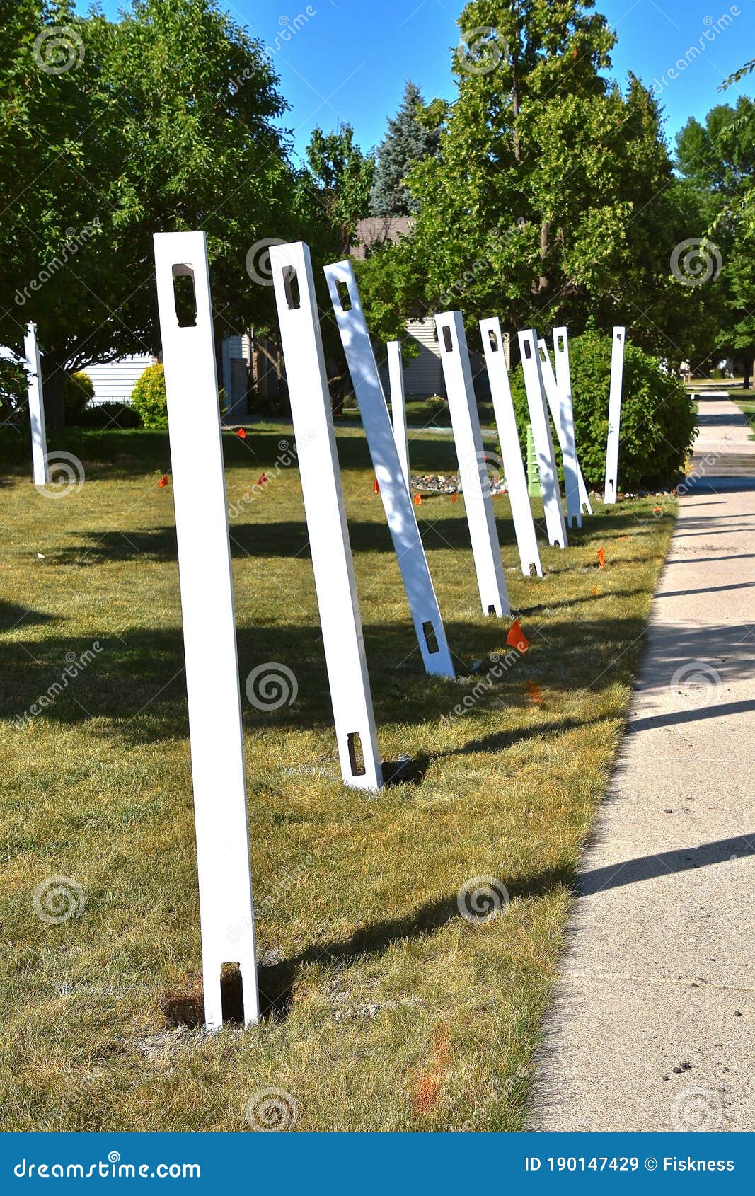 White Vinyl Posts for a Privacy Fence Placed in Pre-dug Holes. Stock ...