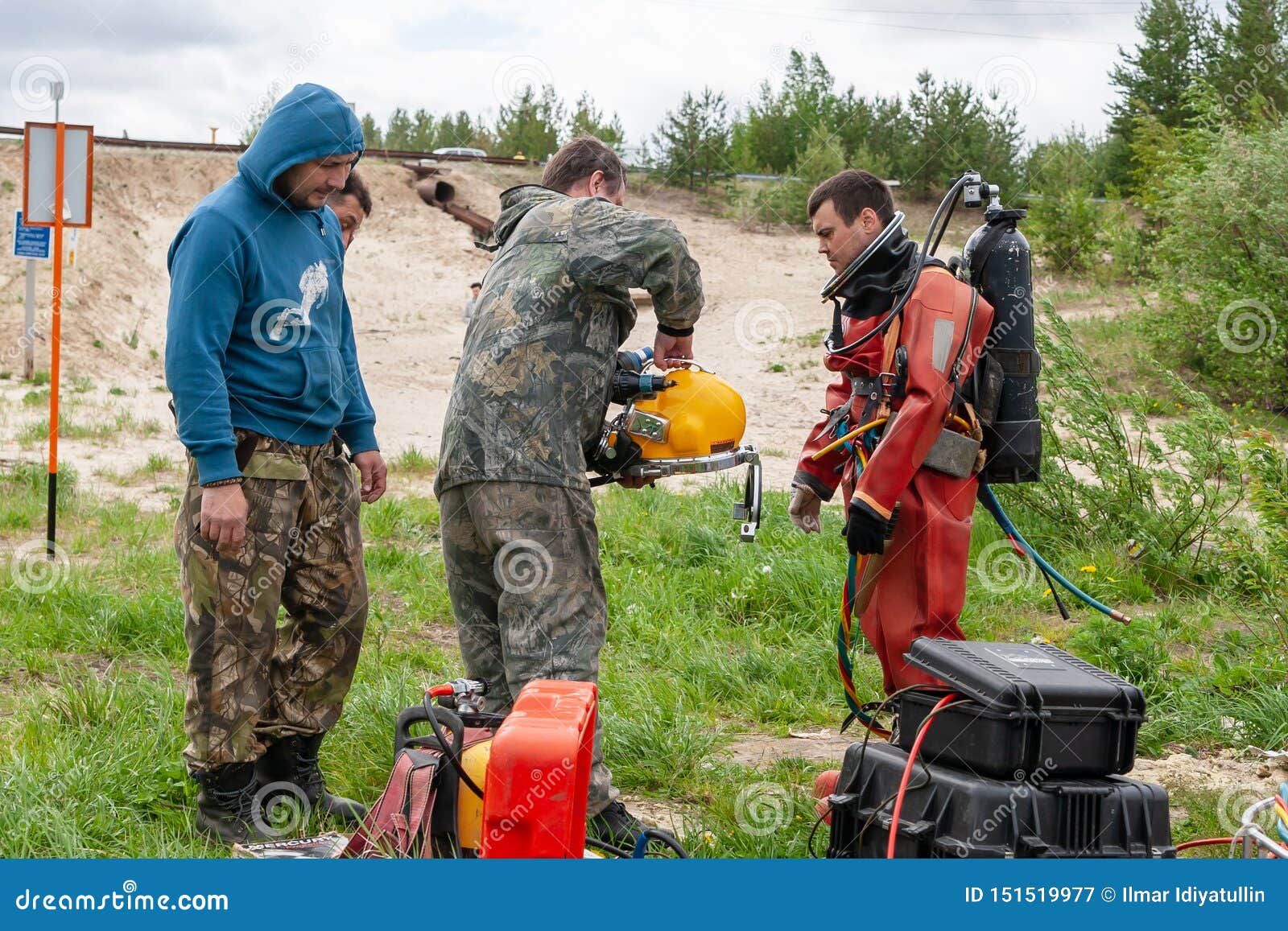 The Support Team Helps the Diver Prepare for Deep-sea Work Editorial ...