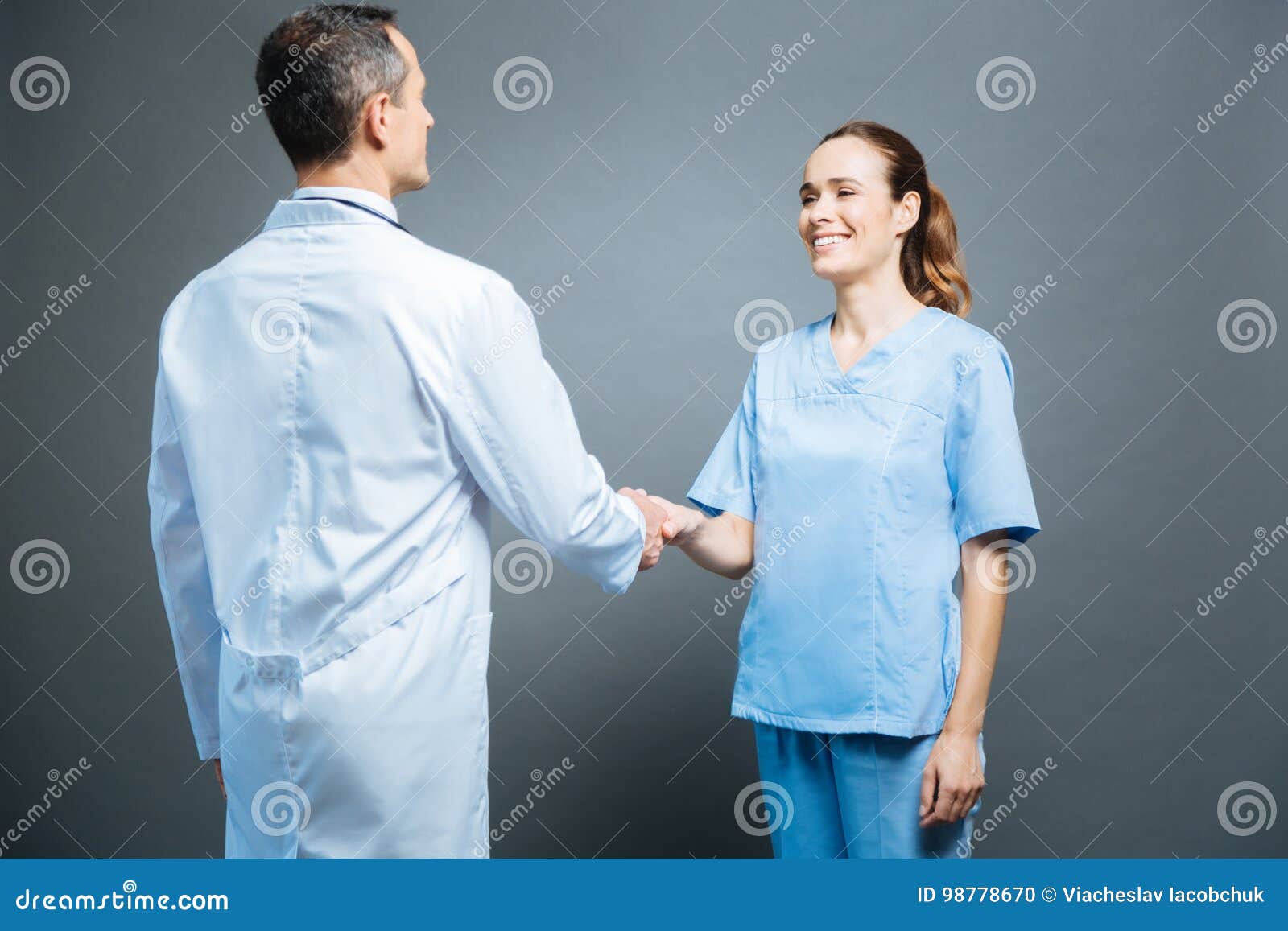 Friendly Medical Professionals Shaking Hands Stock Photo - Image of ...