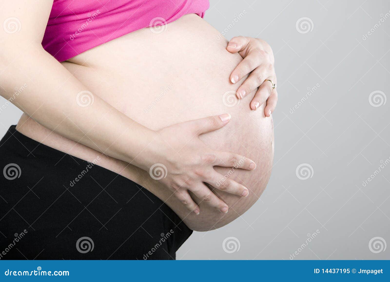 Supporting A Pregnant Woman's Bump Royalty Free Stock Photo - Image ...