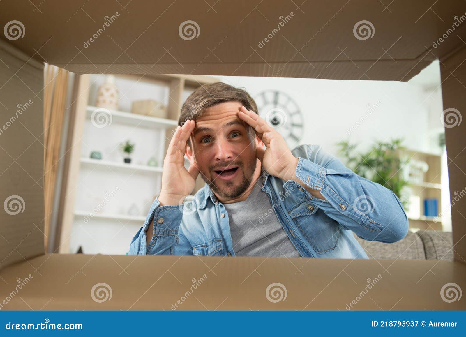 Suprised Man Looking for Something Inside Box Stock Image - Image of ...
