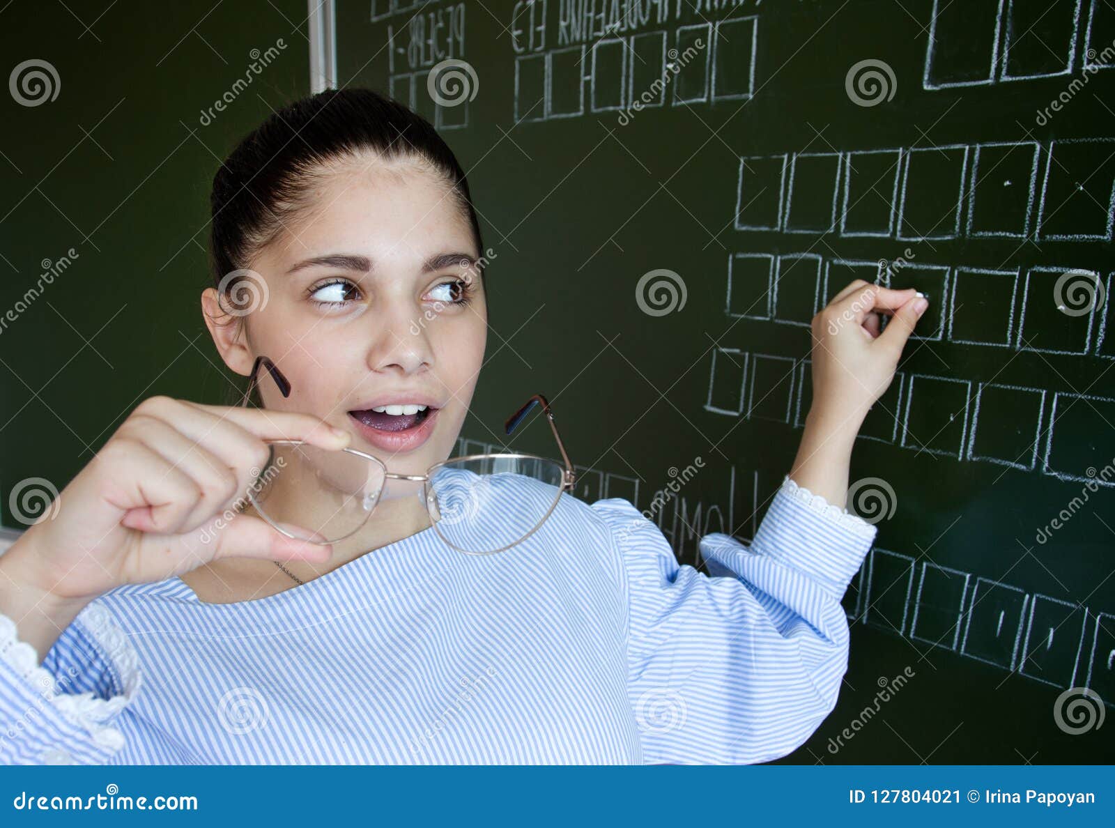 Student Writing on Blackboard with Chalk Stock Image - Image of female ...