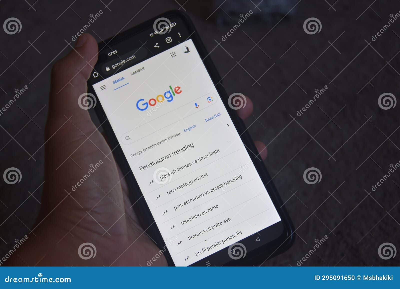 Surabaya, Indonesia. 08-28-2023: a Smartphone Held in the Hand, with a ...