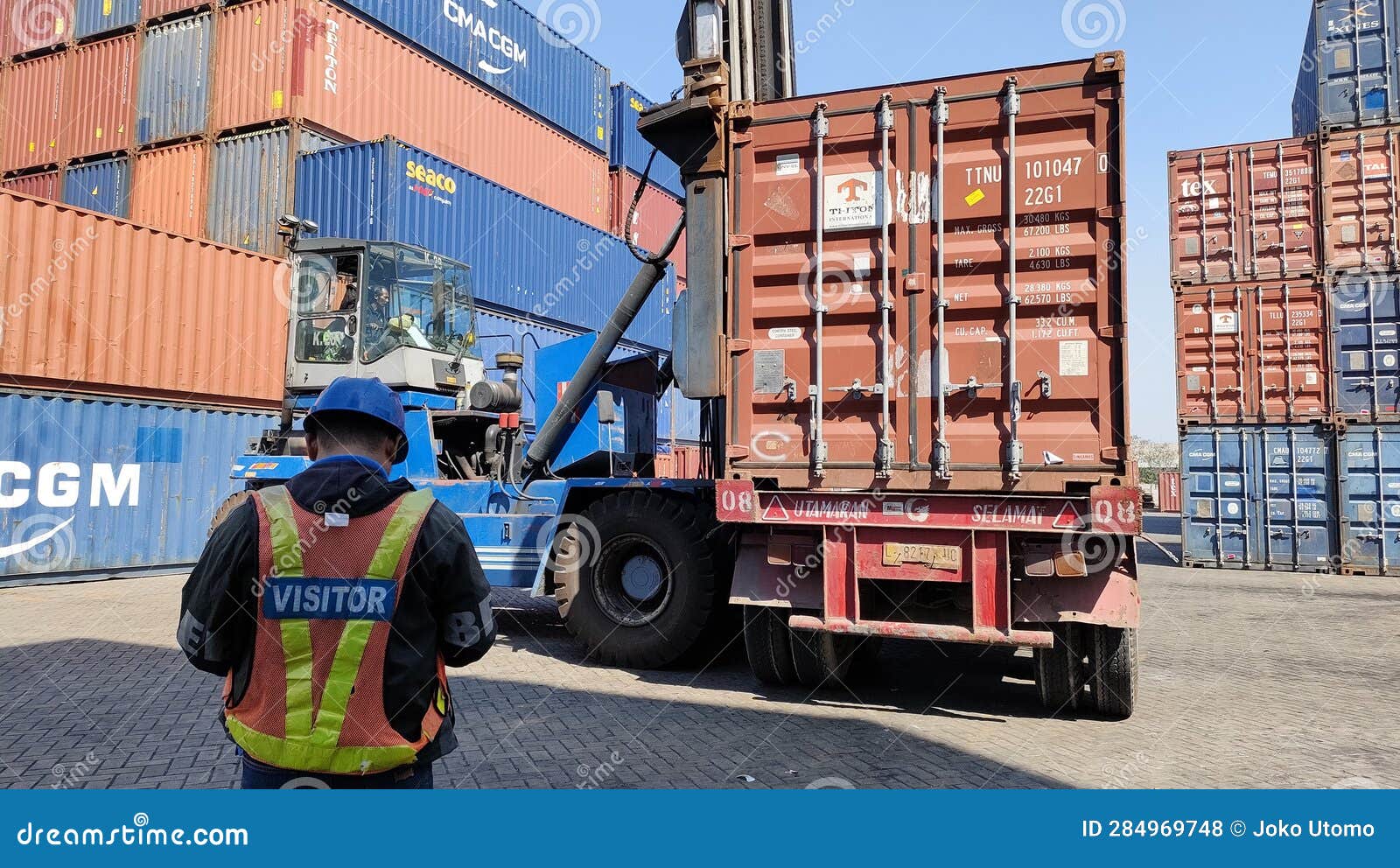 Surabaya, June 22th,an Operator Directing a Stack Container Side Loader ...