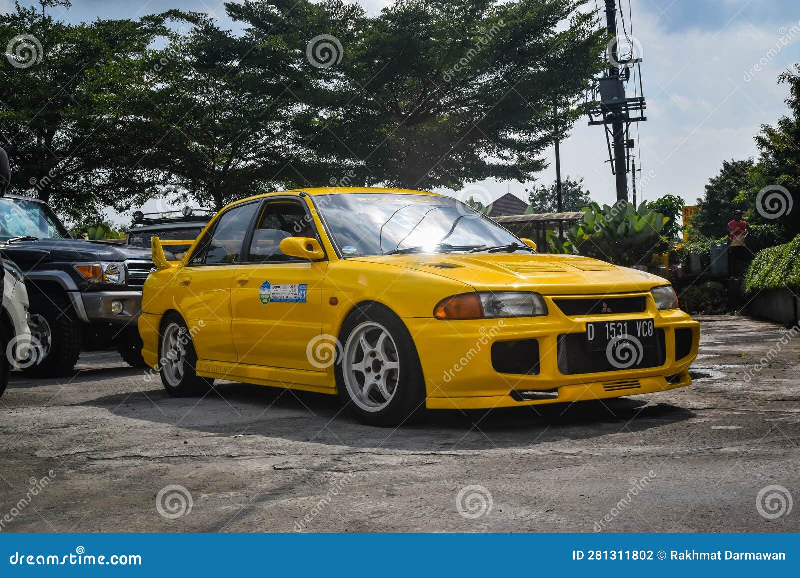Yellow Mitsubishi Lancer Evolution III Leaving JDM Run Car Meet ...