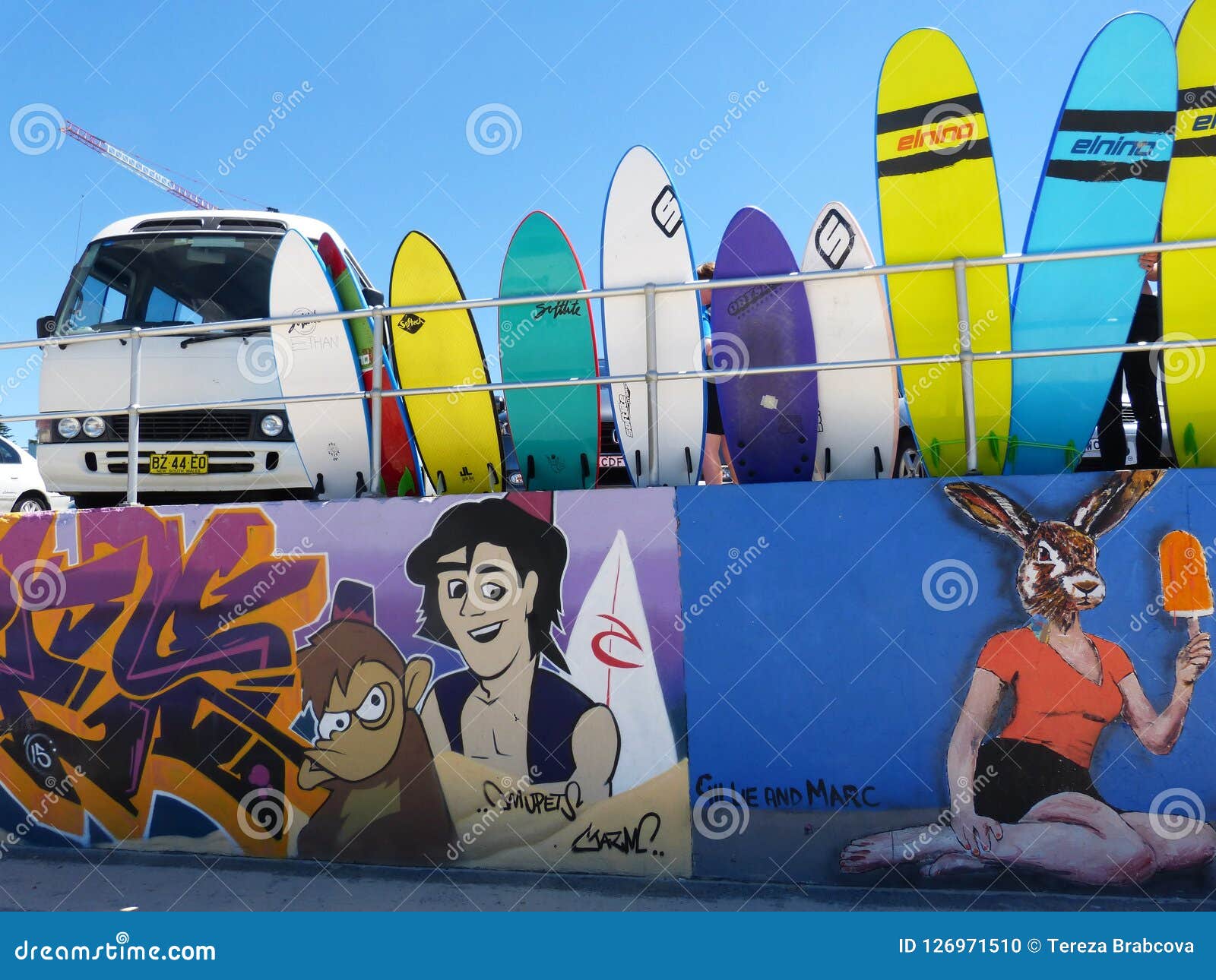 Surf Boards and an Old Van by Graffiti Painted Wall Editorial Image ...
