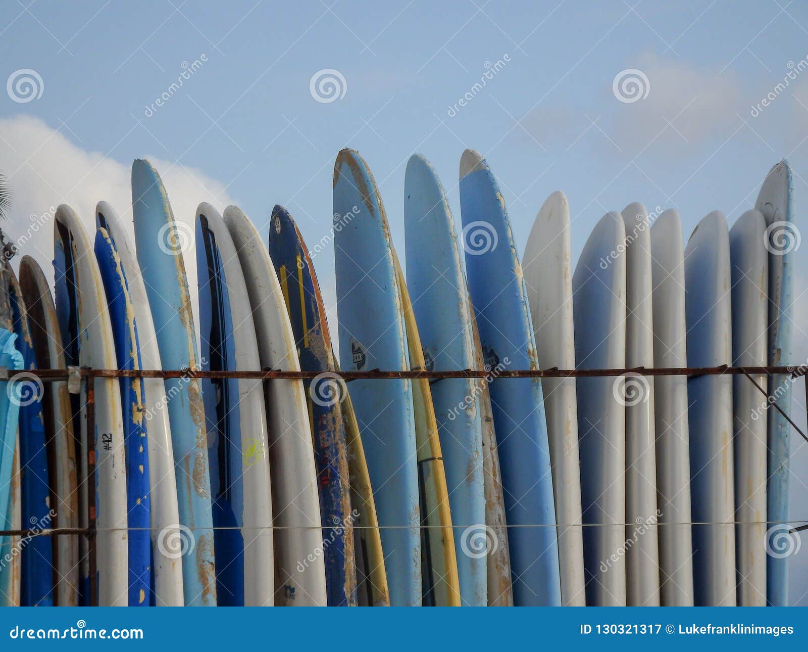 Surf Boards Stacked Vertically Stock Image - Image of sunny, background ...