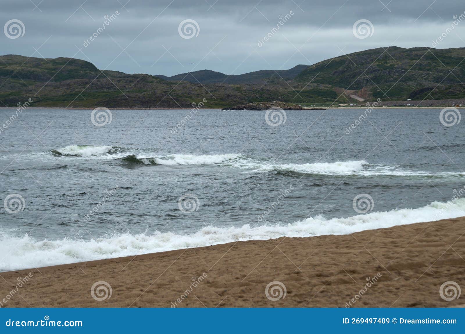 Surf on the Coastline of the North Sea with a Mountainous Coast in the ...