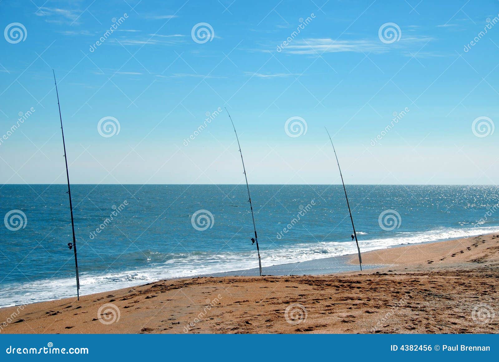 Surf fishing poles stock photo. Image of coastal, relaxation - 4382456