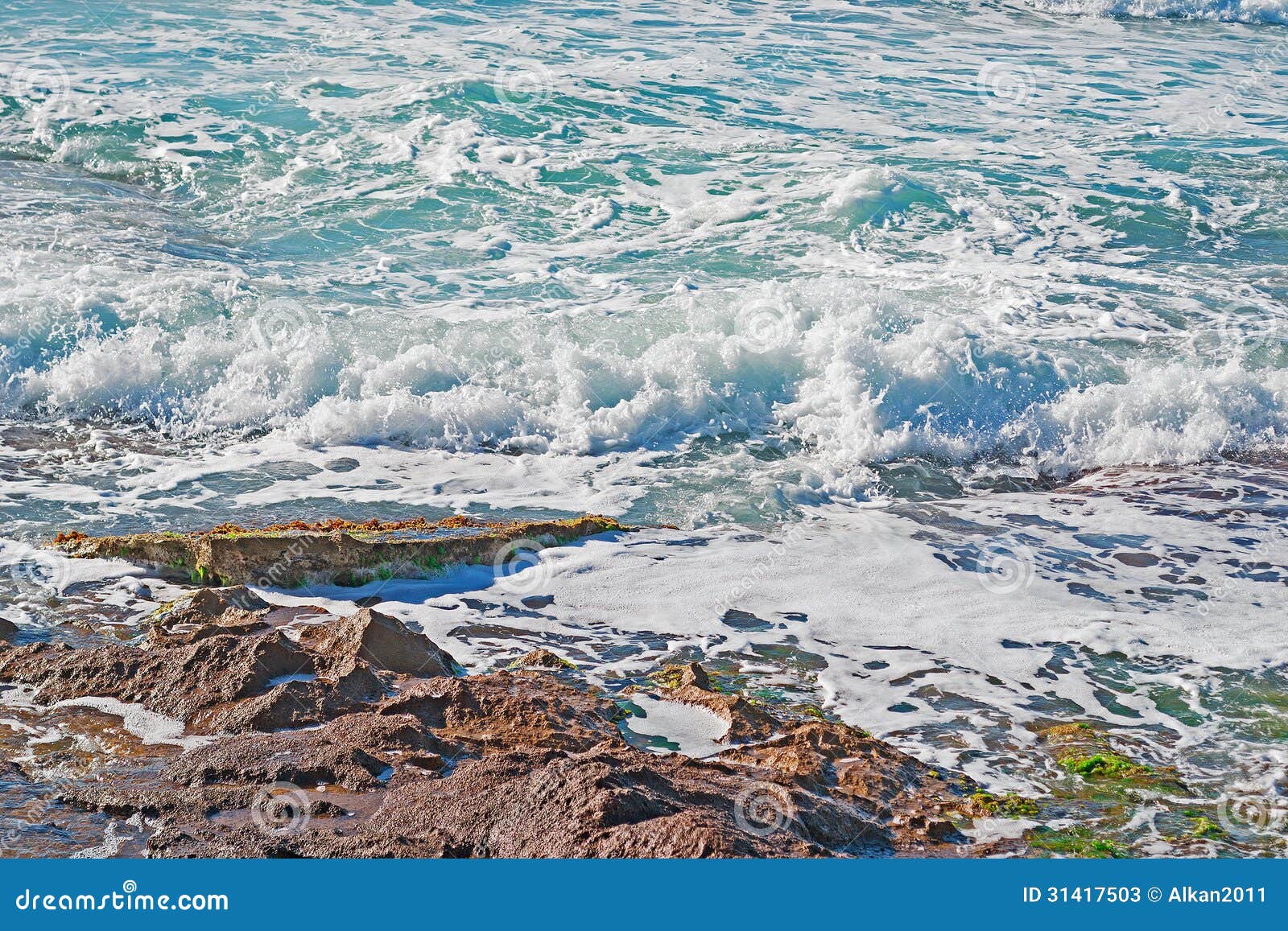 Surf by the rocks stock image. Image of skim, beautiful - 31417503