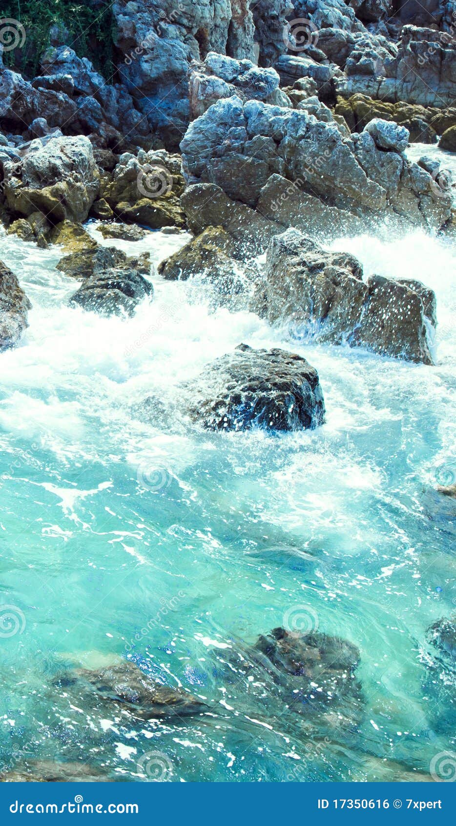 Surf on stones near island stock photo. Image of tropical - 17350616