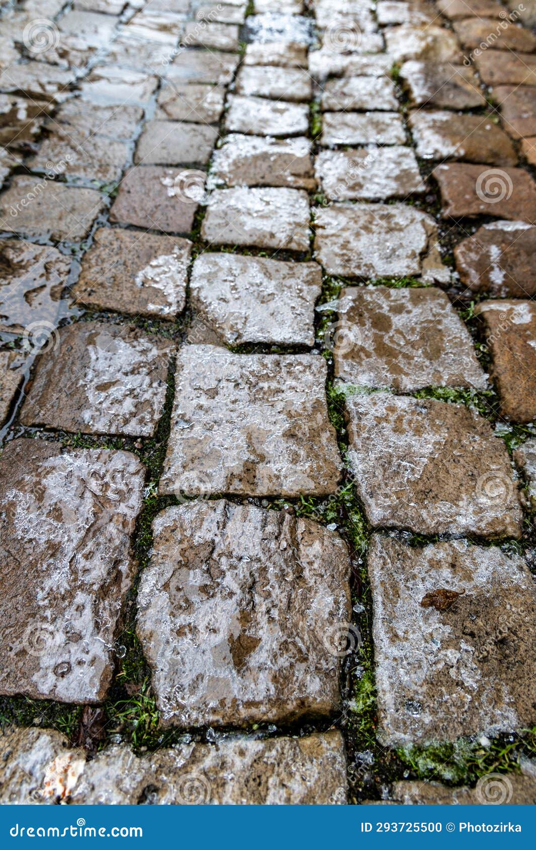 The Surface of the Cobblestones is Covered with Ice Stock Photo - Image ...