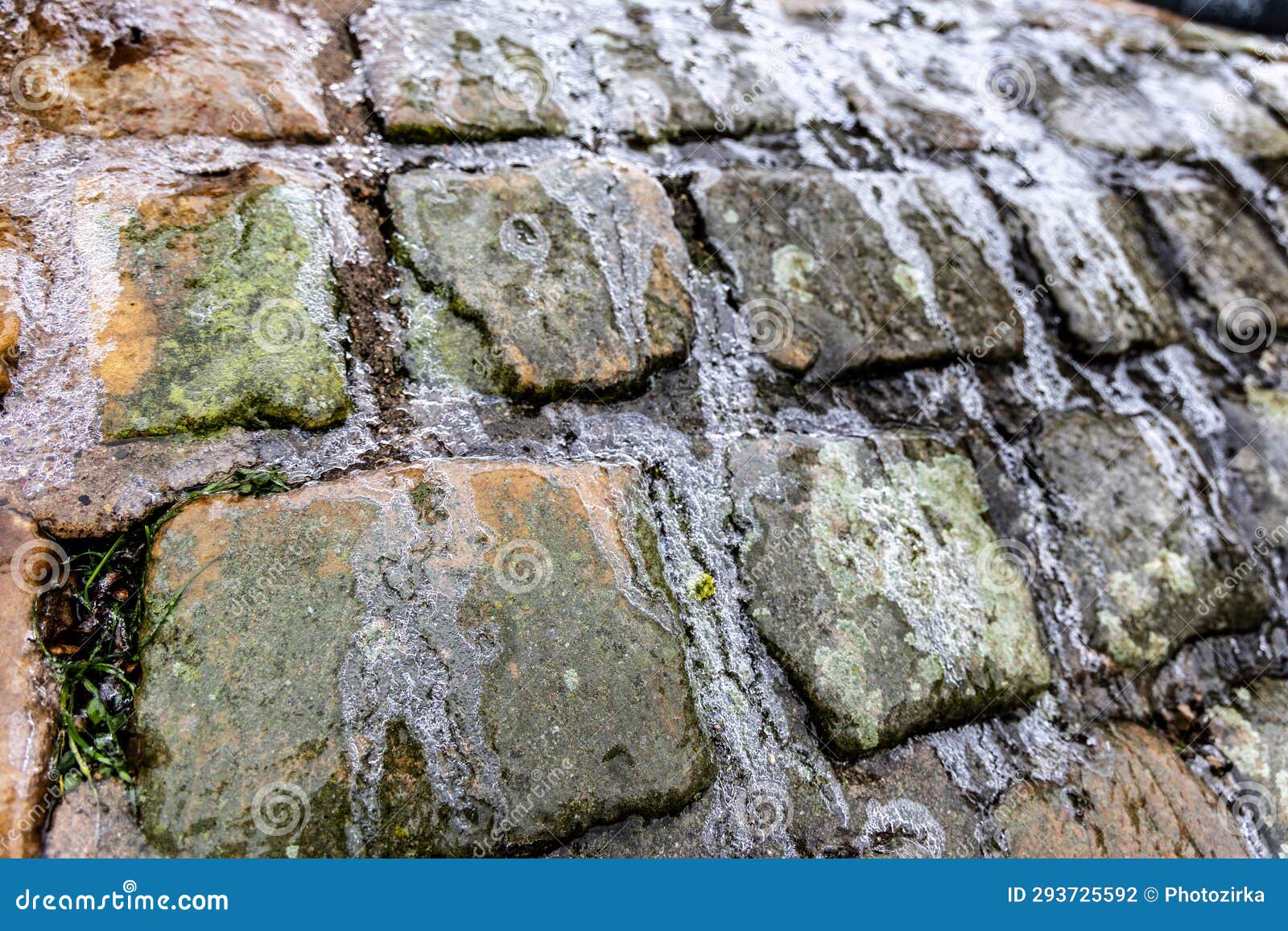 The Surface of the Cobblestones is Covered with Ice Stock Photo - Image ...