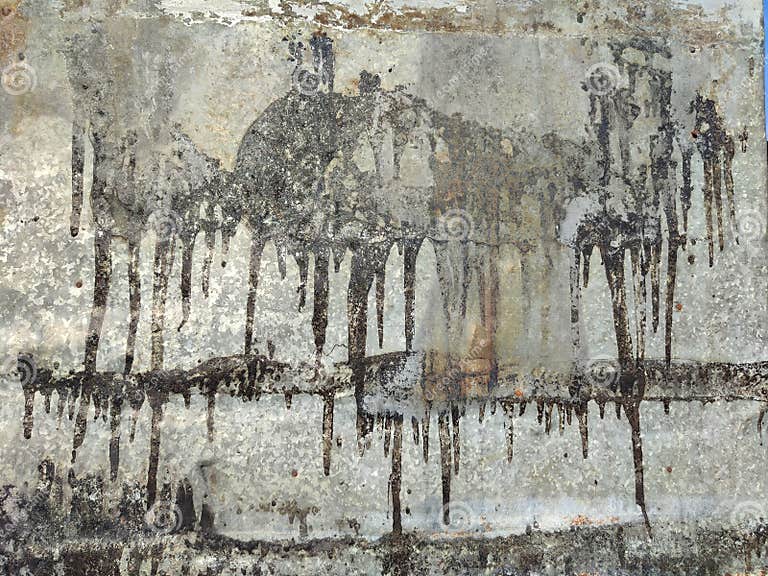 A Weathered and Textured Wall Showcasing Intricate Patterns and Drips ...