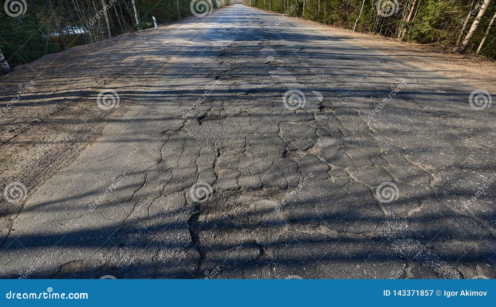 Surface of the Highway is Illuminated by the Slanting Rays of the Sun ...
