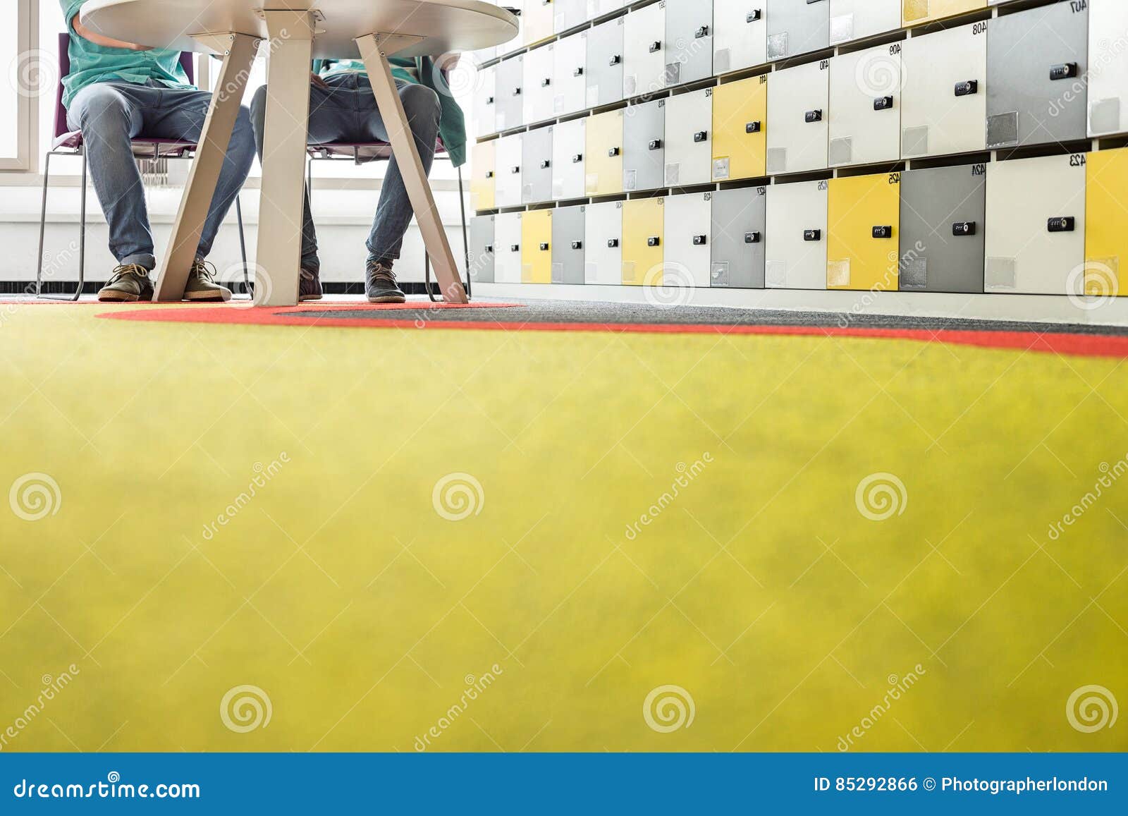Surface Level of Businessmen at Table in Creative Office Stock Photo ...