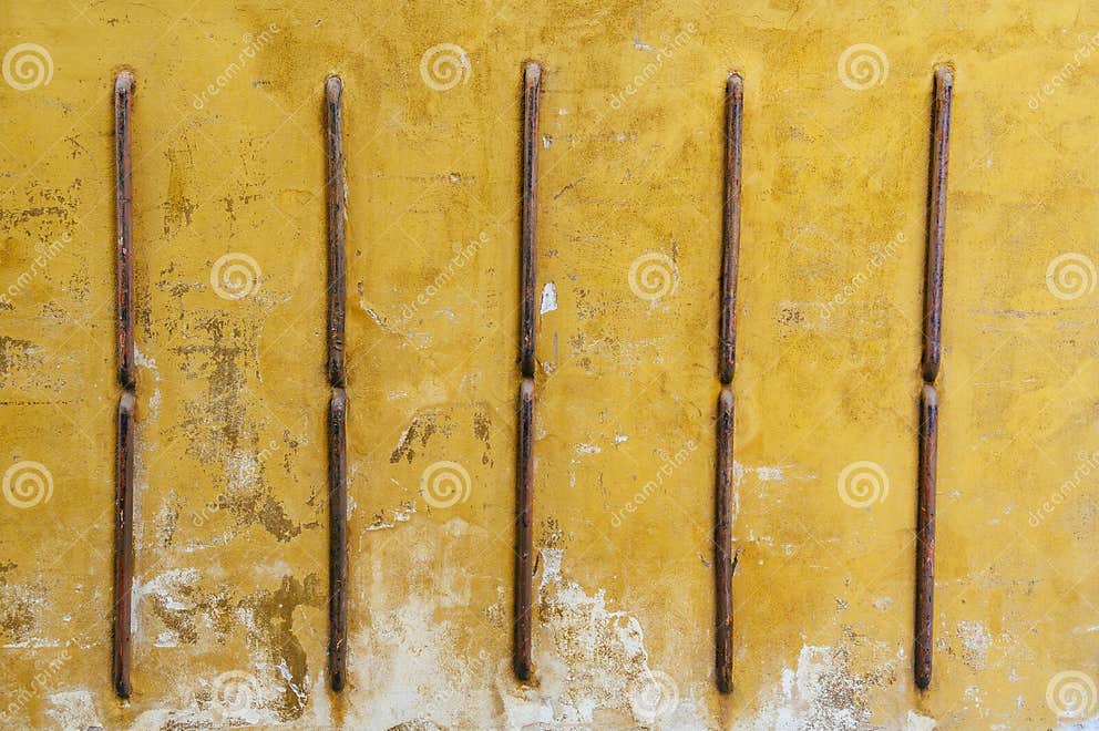 The Surface of an Old Yellow-painted Wall with Numerous Scratches ...