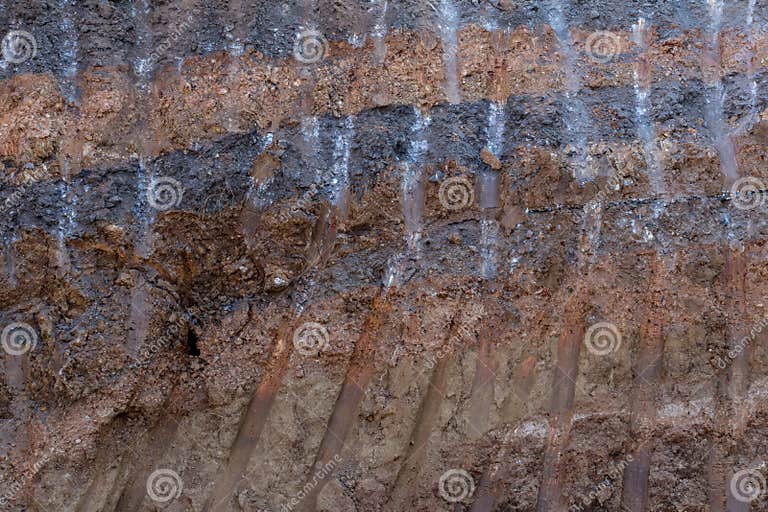 Surface Soil Layer Under the Road with Digging Trails Stock Image ...