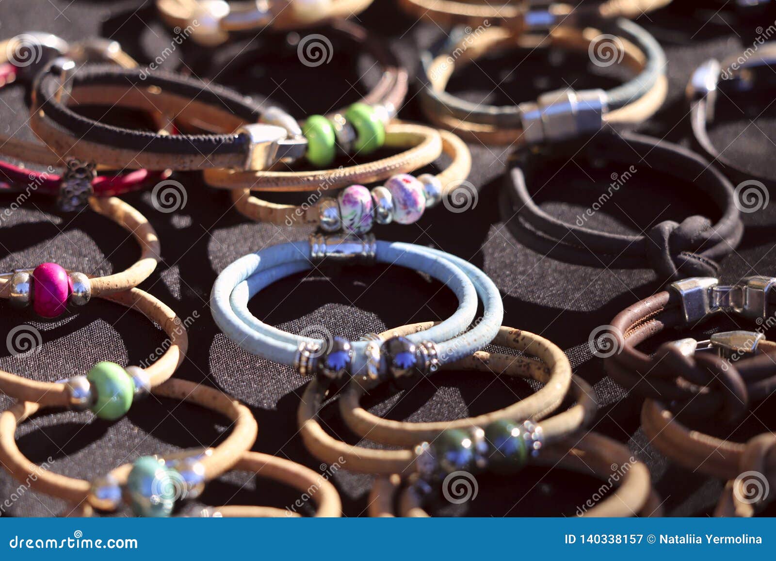 On the Surface of the Table are Many Female Round Bracelets of ...