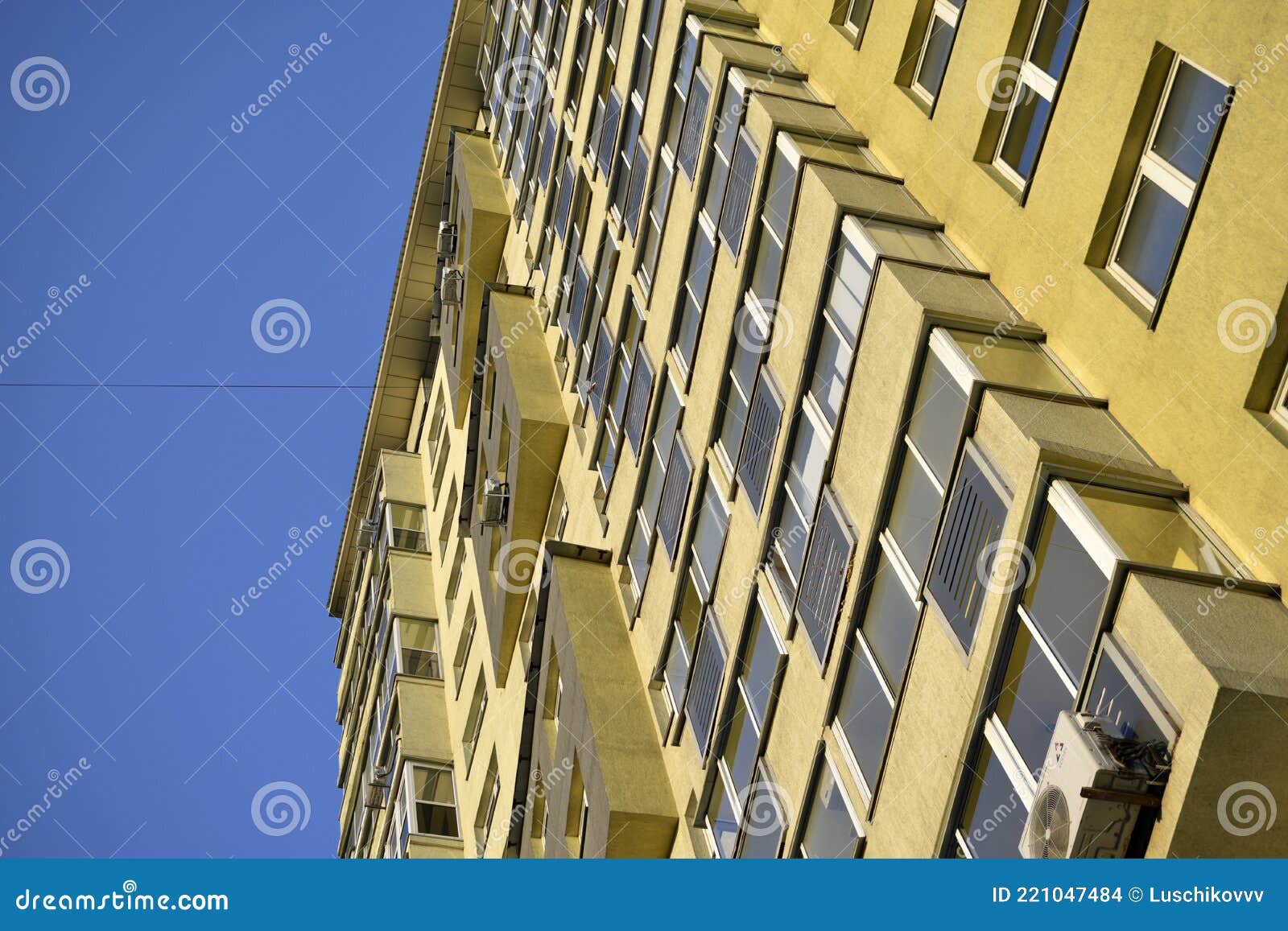 The Surface and Walls of a Yellow High Residential Building Stock Photo ...
