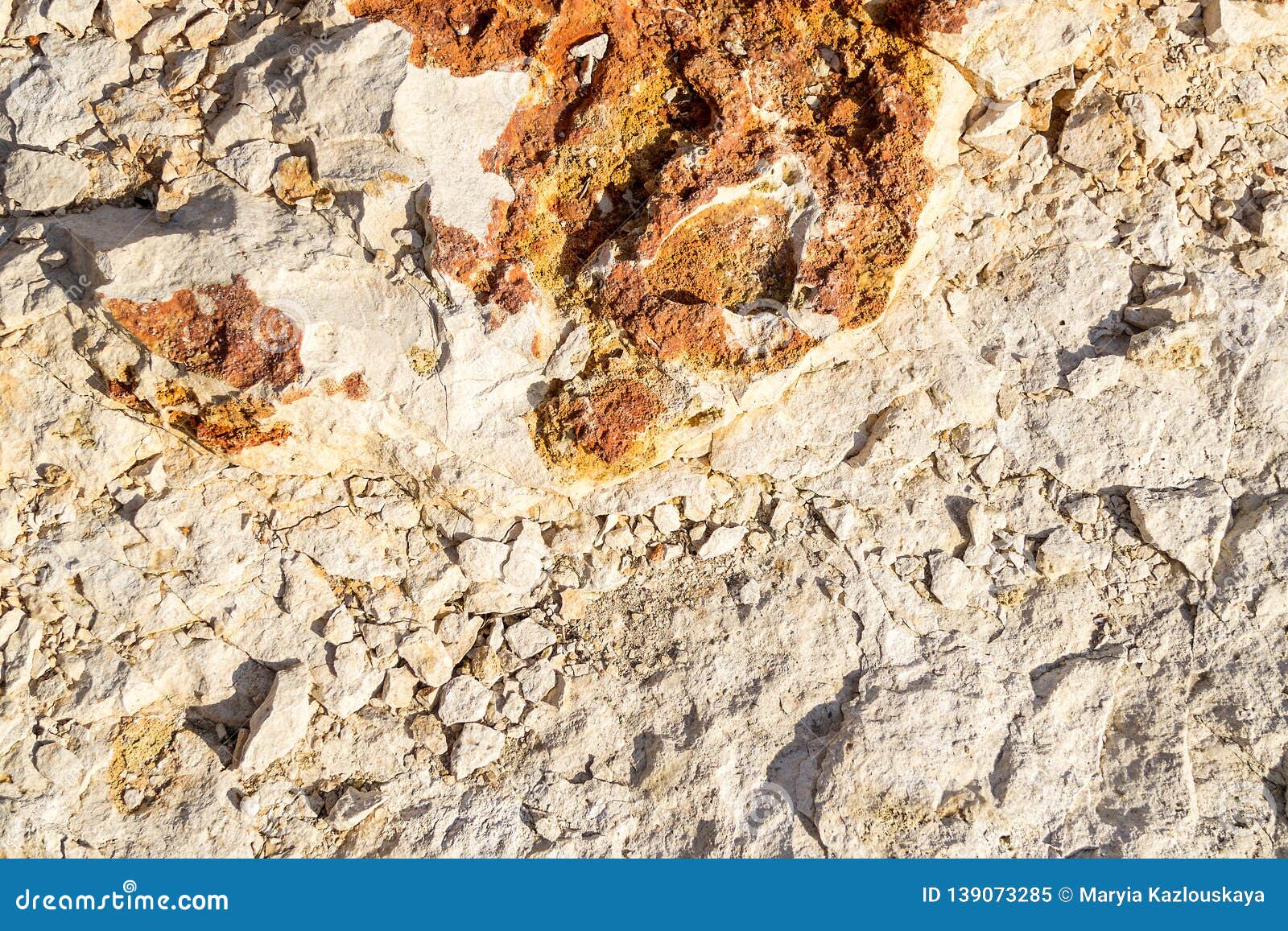 Surface of a White Crumbled Rock with Red Spot Illuminated by a Bright ...