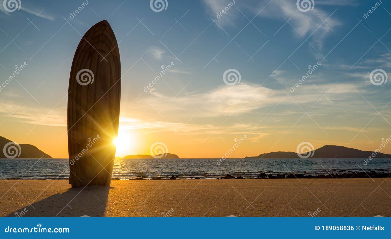 Surfboard on the Beach at Sunset Stock Photo - Image of person, extreme ...