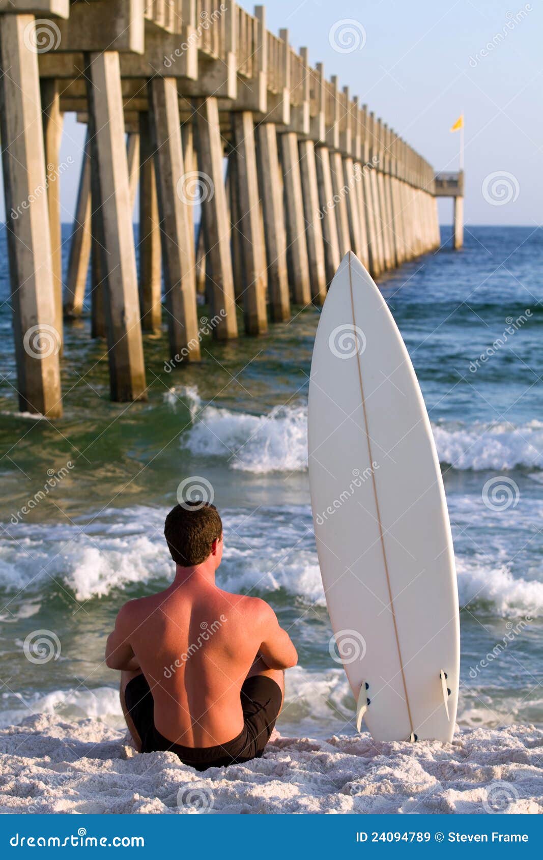 Surfboarder by Pier stock image. Image of male, pensacola - 24094789