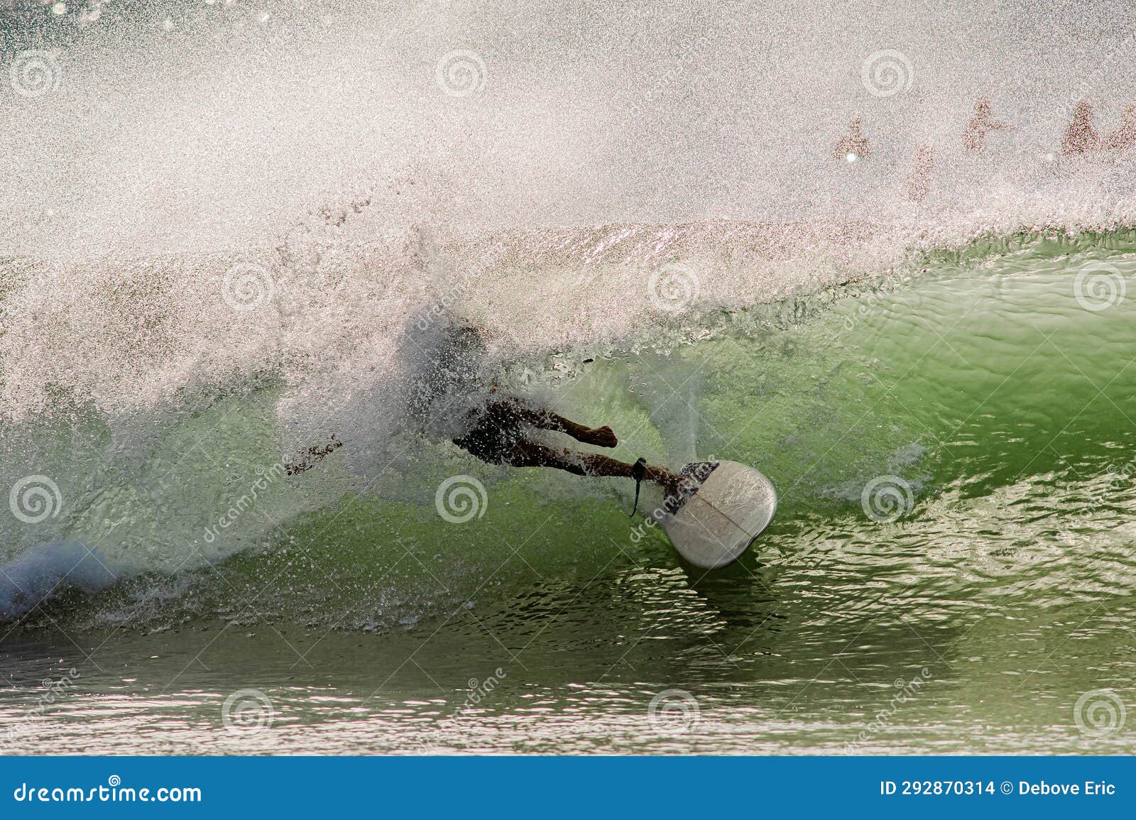 Surfer in a Barrel Falling Under the Force of the Waves Stock Photo ...