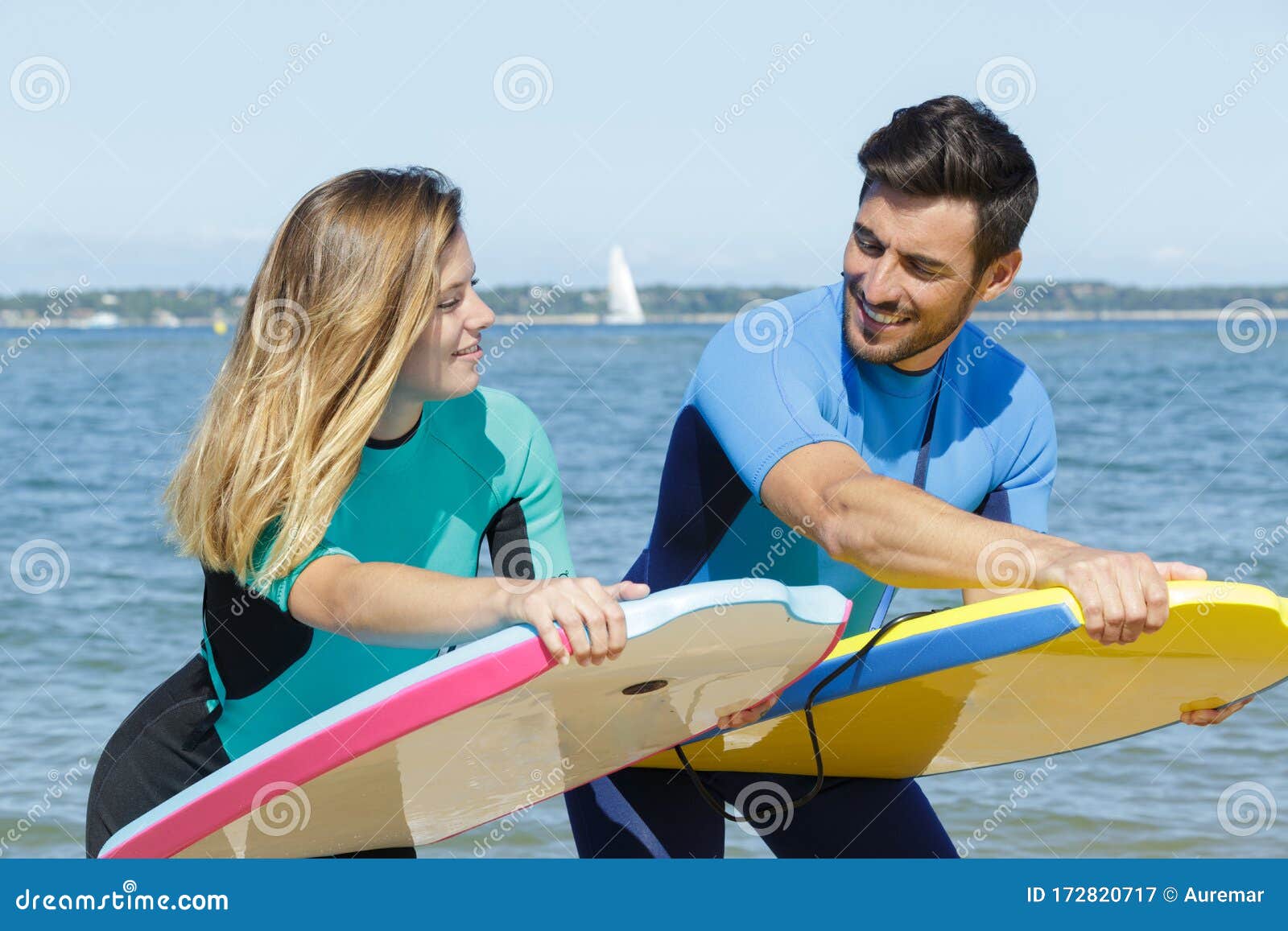 Surfer Beginner and Instructor on Beach with Surfboards Stock Image ...