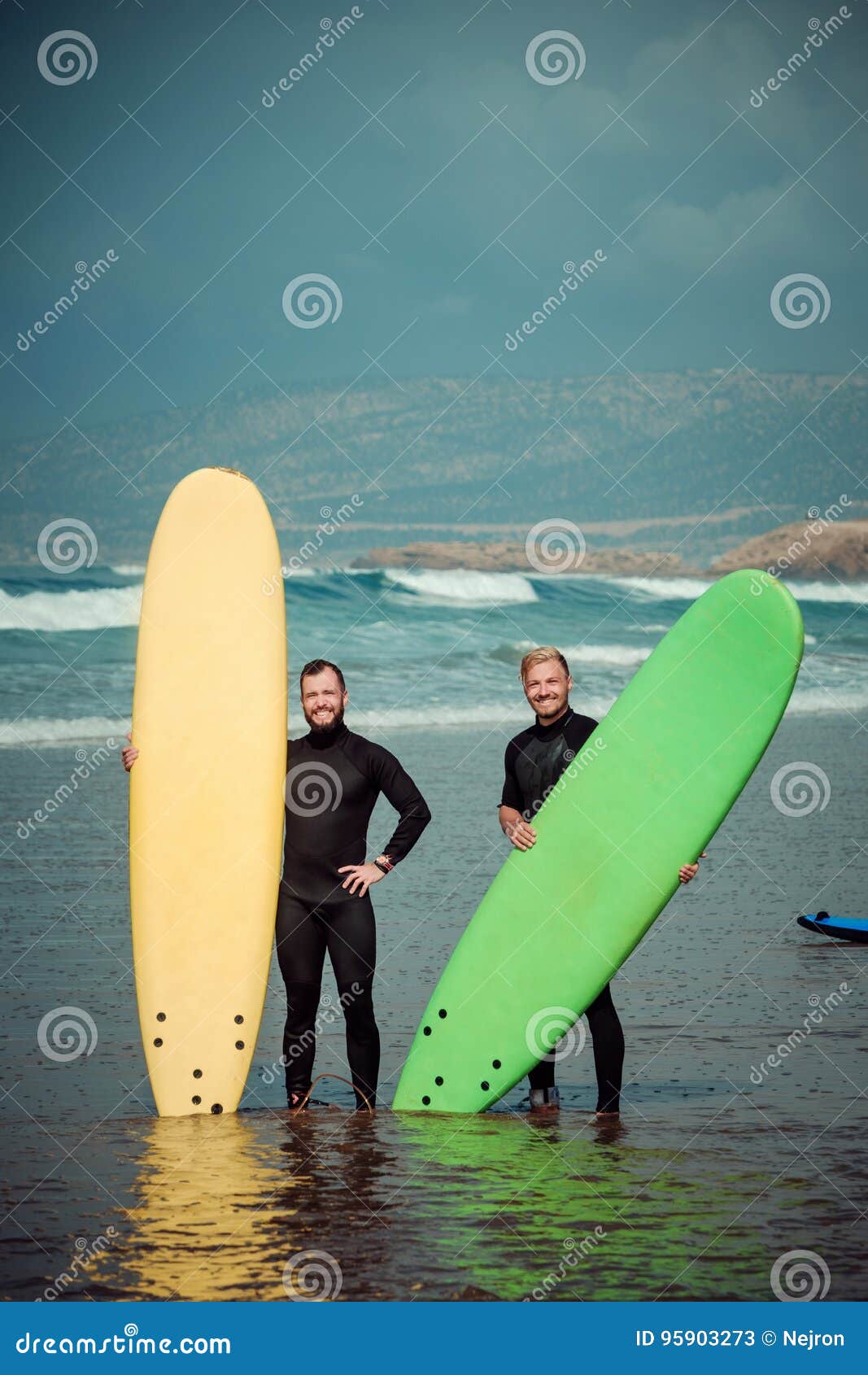 Surfer Beginner and Instructor on a Beach with a Surfing Boards Stock ...