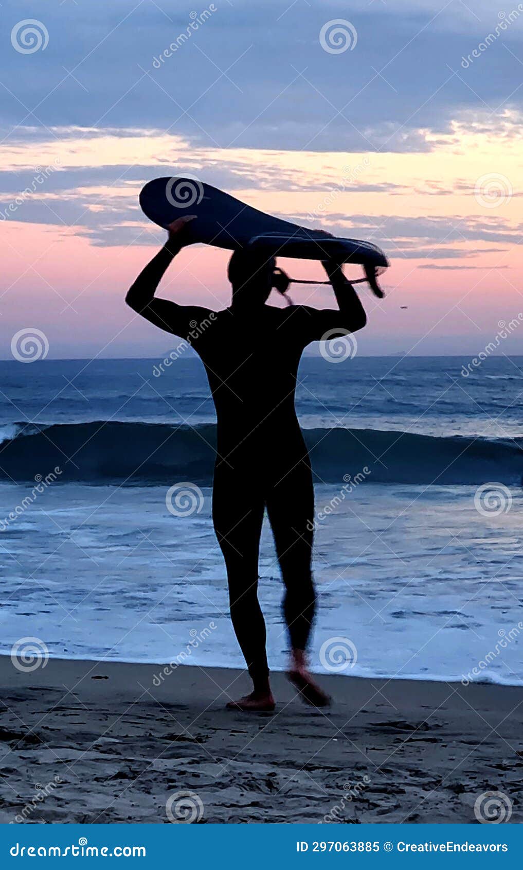 Surfer Carrying Surfboard Overhead into Ocean Waves Stock Image - Image ...