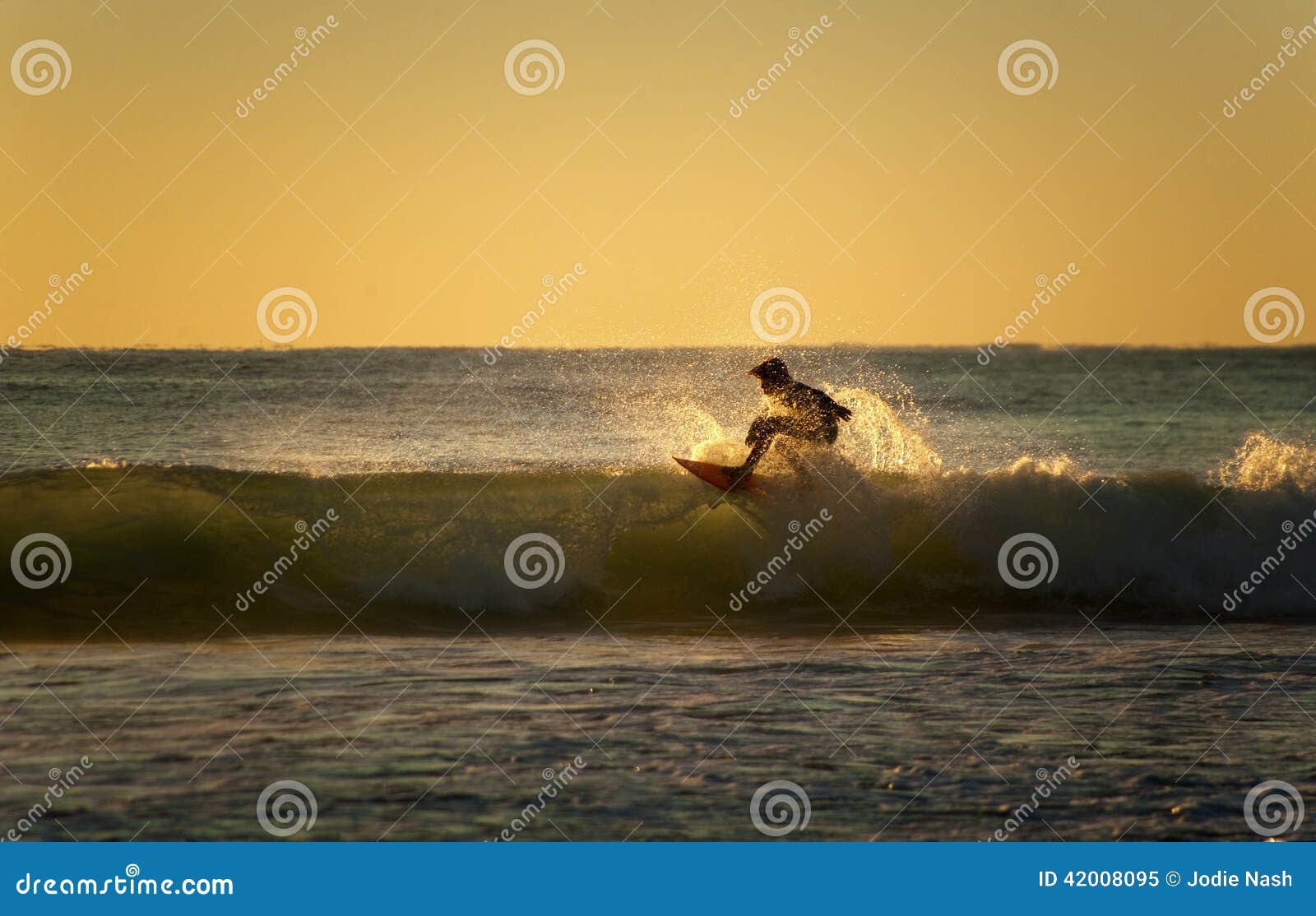 Surfer Catches the Wave in Australia Stock Image - Image of shadow ...