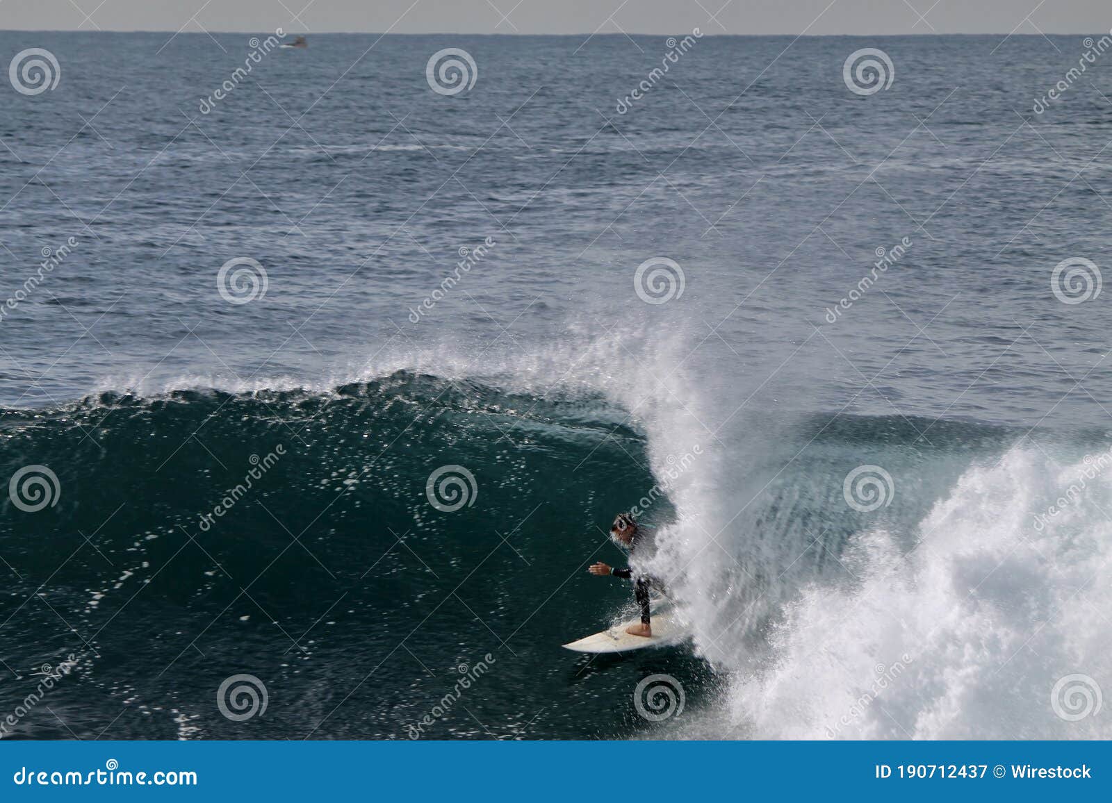 Surfer catching the wave stock image. Image of person - 190712437