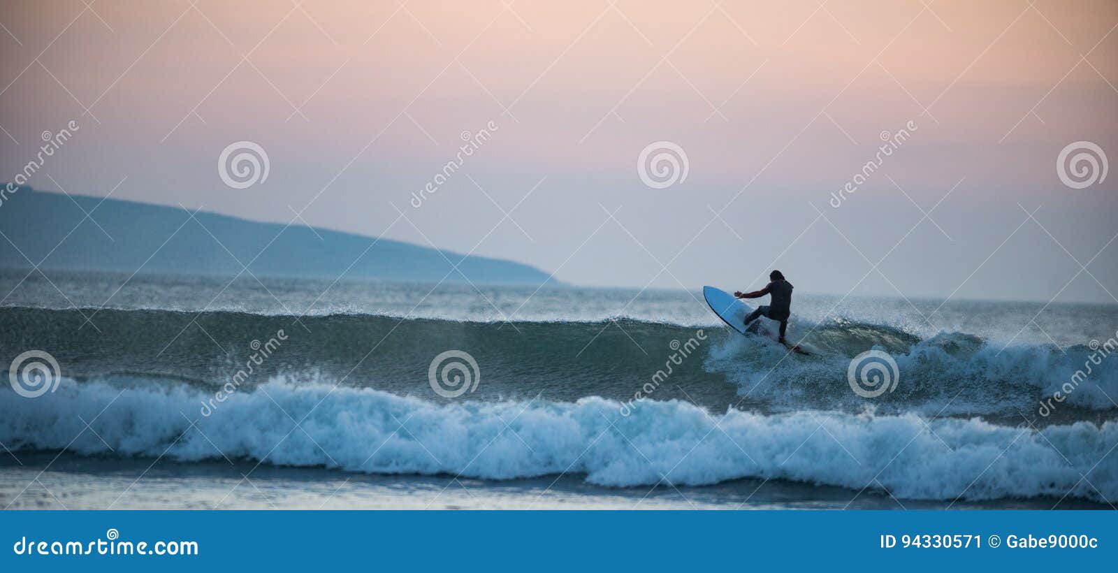 Surfer Catching a Wave at Sunset Stock Image - Image of beach ...