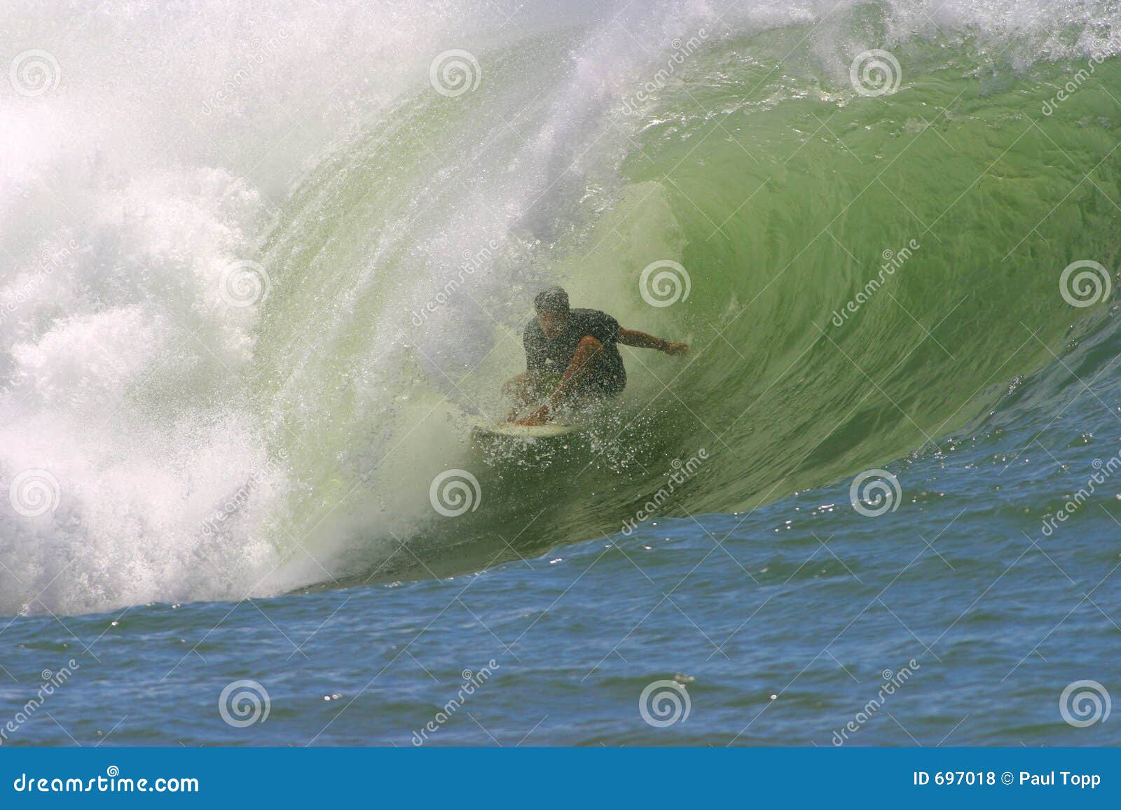 Surfer in the Curl of a Tube Wave Stock Photo - Image of surfers, ocean ...