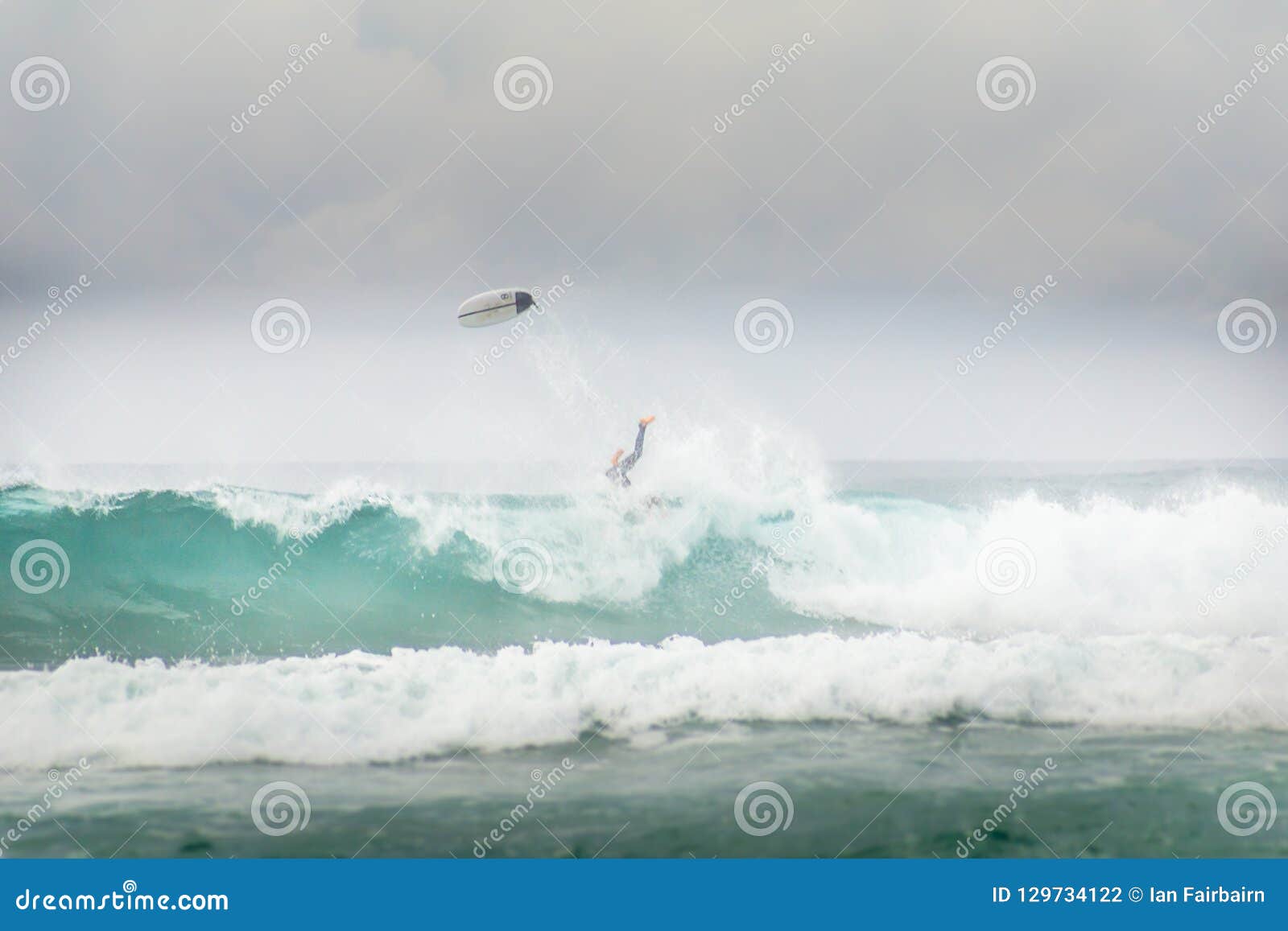 Surfer falling off wave stock photo. Image of relax - 129734122