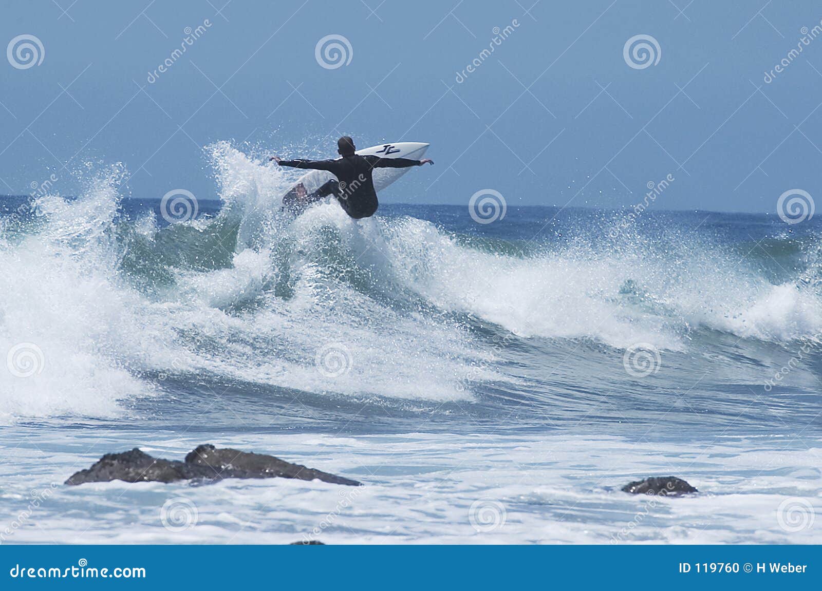 Surfer getting Air stock photo. Image of wetsuit, pacific - 119760