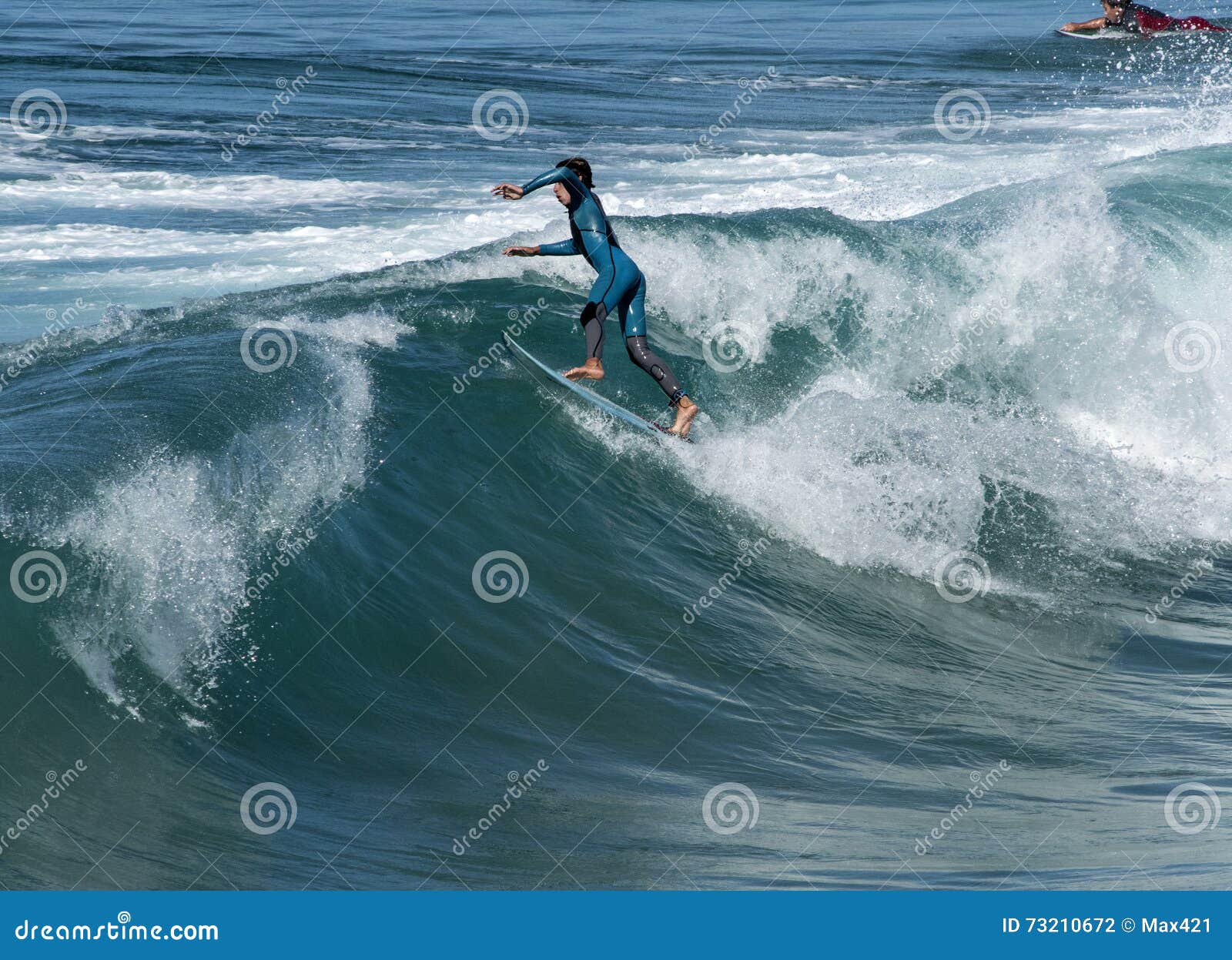 Surfer going backwards editorial photography. Image of wave - 73210672