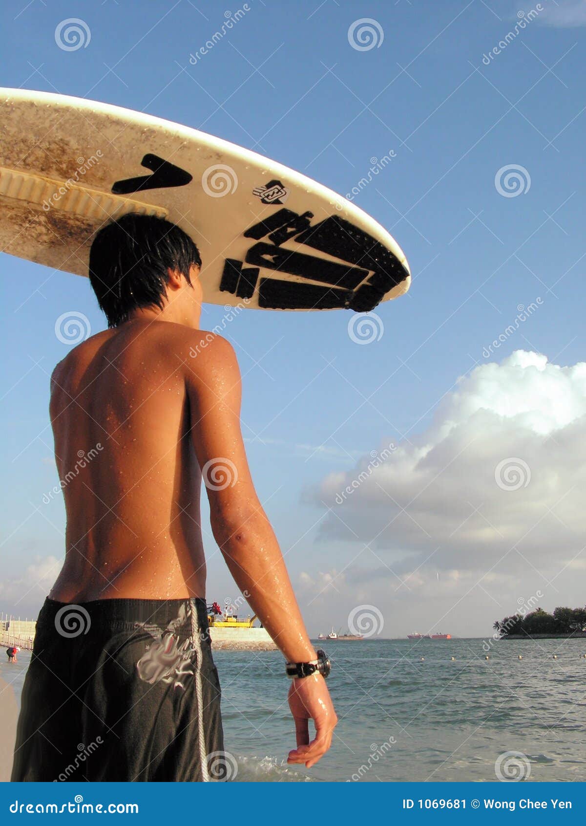 Surfer Guy Waiting for Waves Stock Image - Image of equator, surf: 1069681