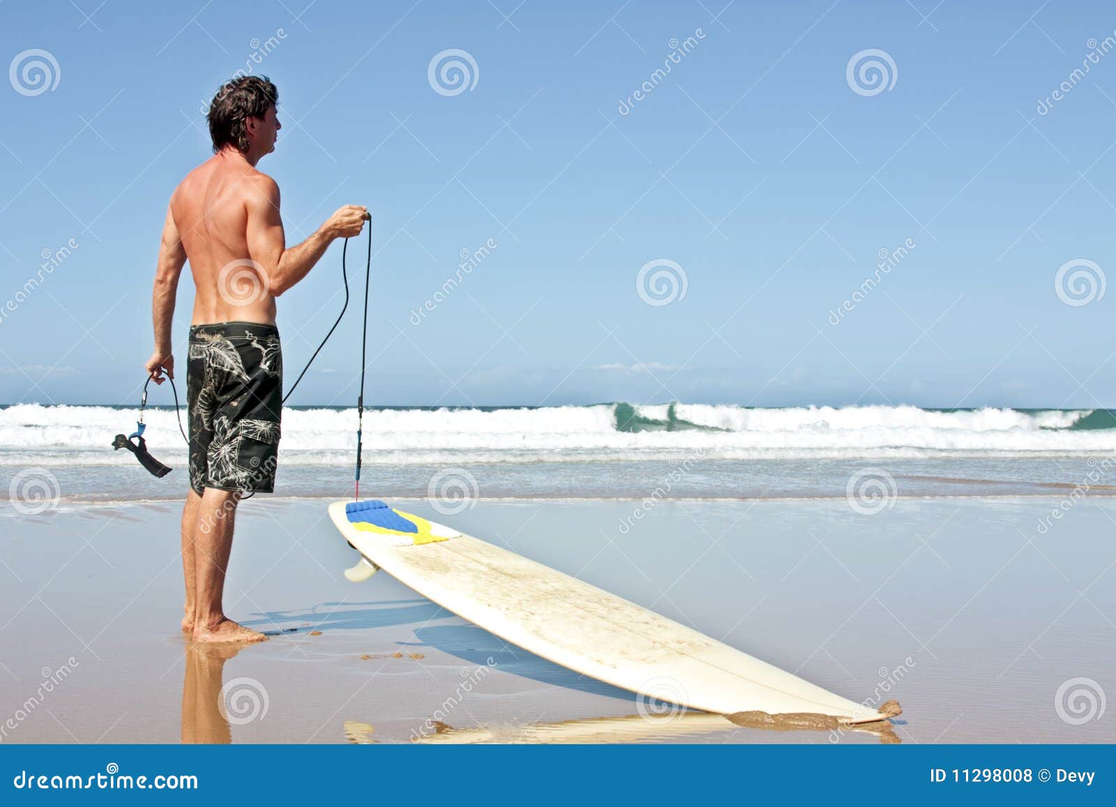 Surfer with His Surfboard at the Beach Stock Photo - Image of outdoor ...