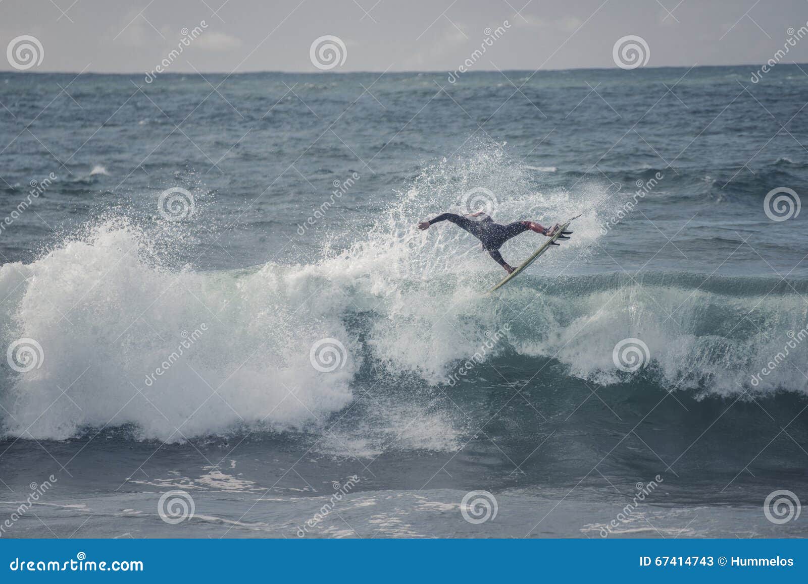 Surfer jumps stock image. Image of performs, atlantic - 67414743
