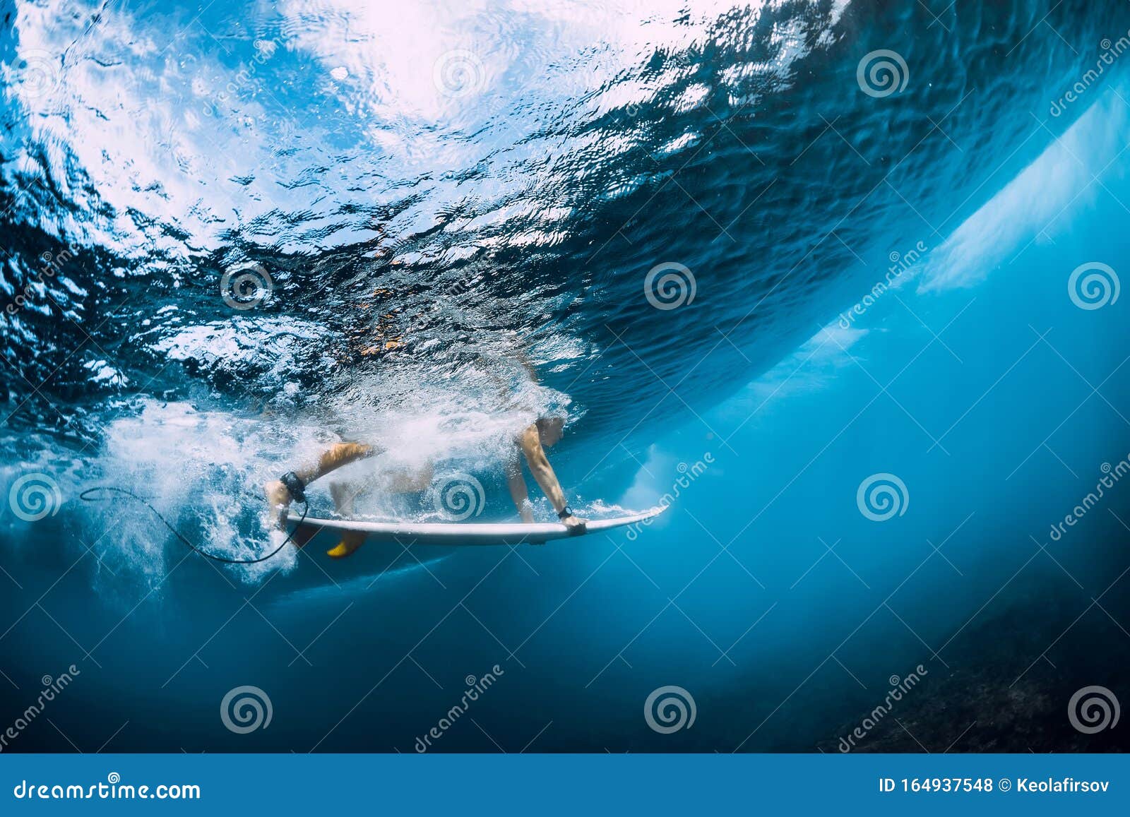 Surfer Make Duck Dive Underwater. Surfgirl Dive Under Wave Stock Photo ...