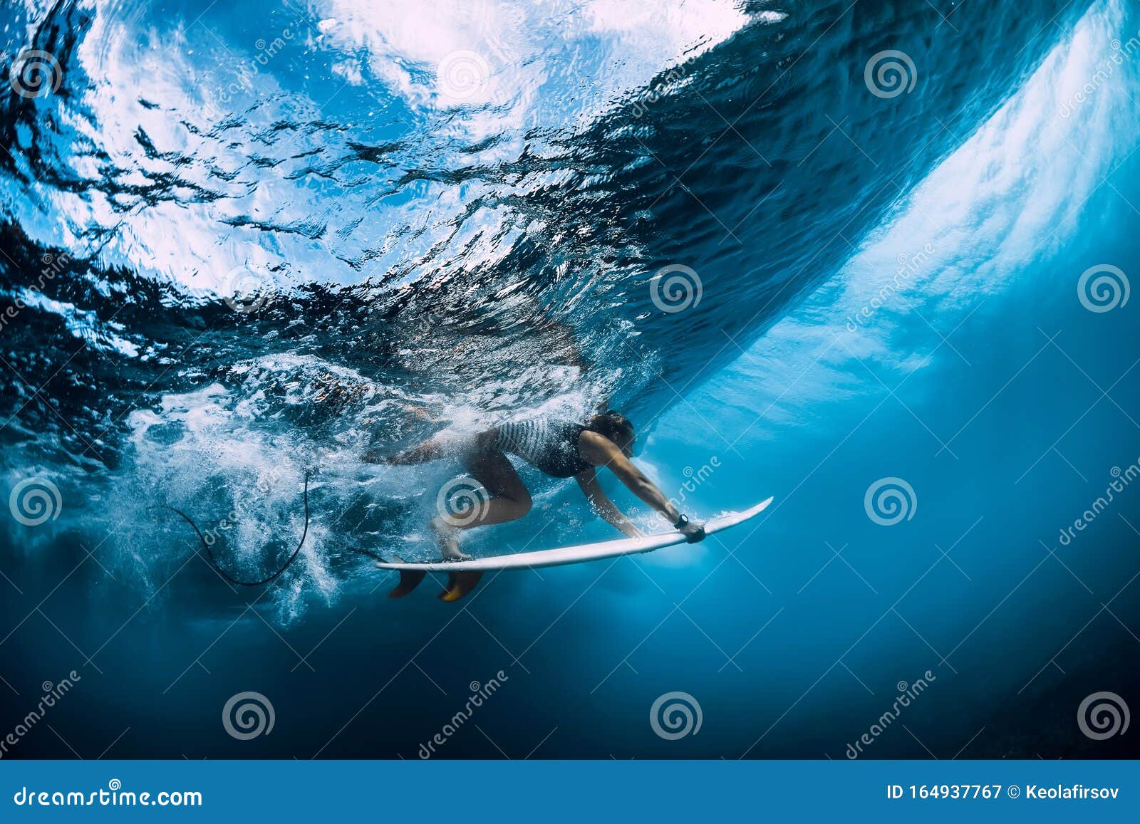 Surfer Make Duck Dive Underwater. Surfgirl Dive Under Wave Stock Image ...