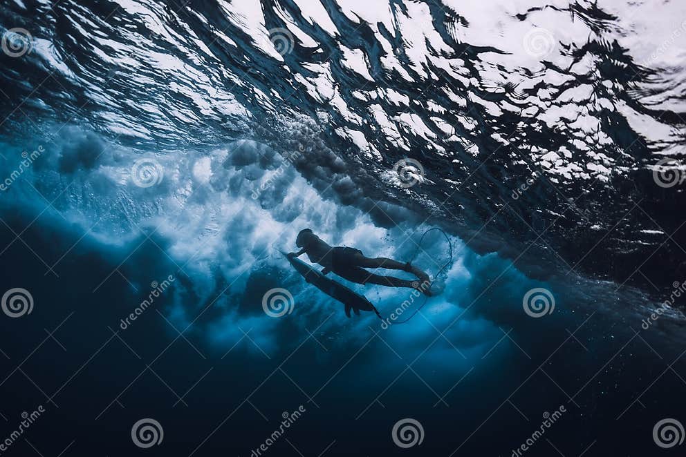 Surfer Man with Surfboard Dive Underwater. Surfer Under Ocean Wave ...