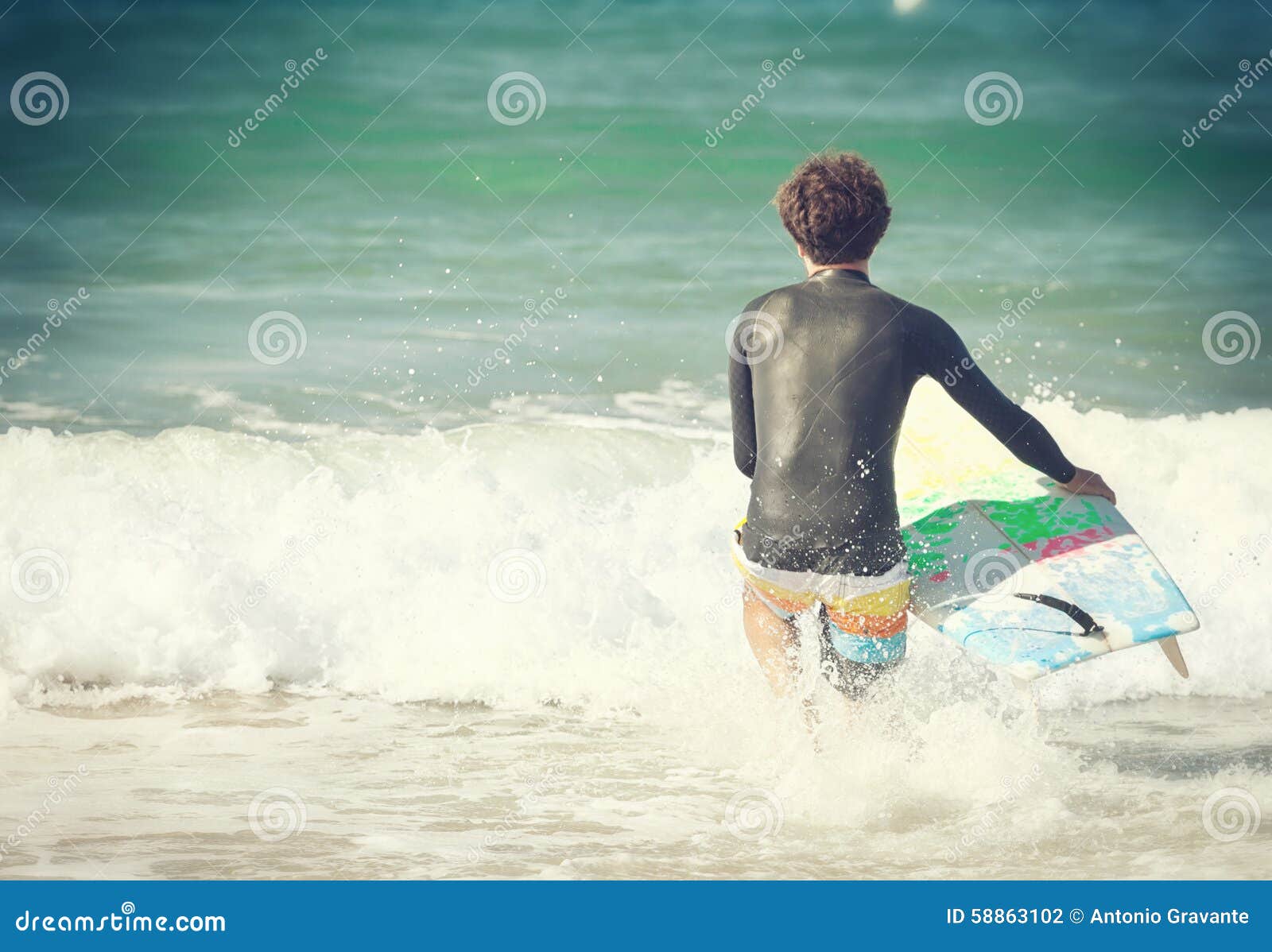 Surfer Ready To Enter the Water for Surfing Stock Photo - Image of ...