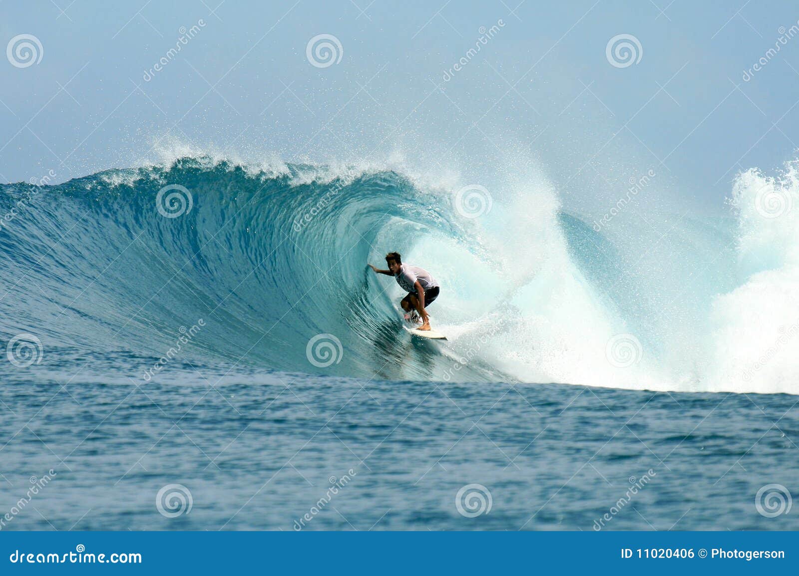 Surfer Riding in Barrel on Perfect Wave Stock Photo - Image of barrel ...