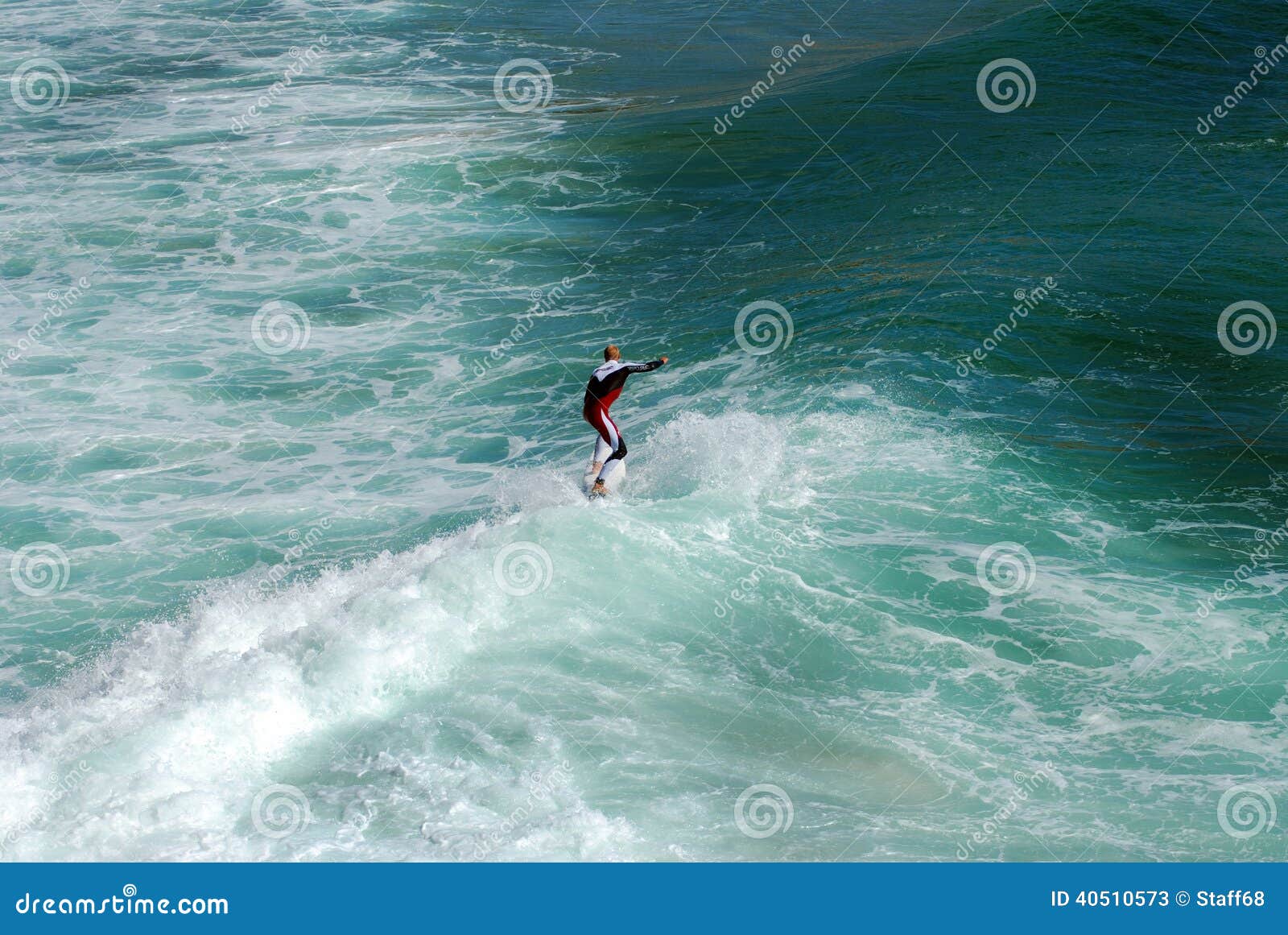 Surfer riding a wave editorial stock photo. Image of watersport - 40510573