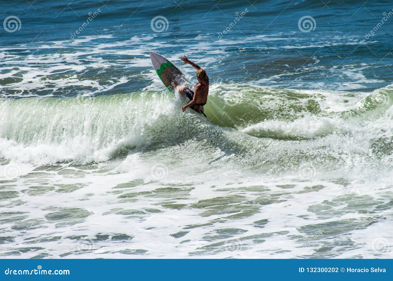 Surfer in the Sea on the Waves about To Fall Editorial Photography ...