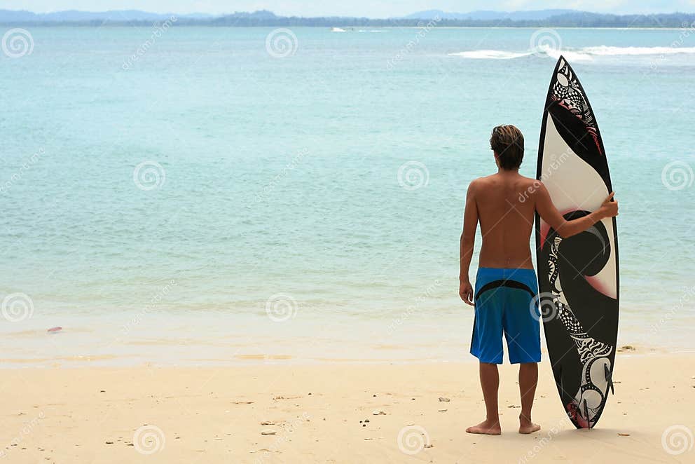 Surfer Standing on Beach with Funky Arty Surfboard Stock Image - Image ...