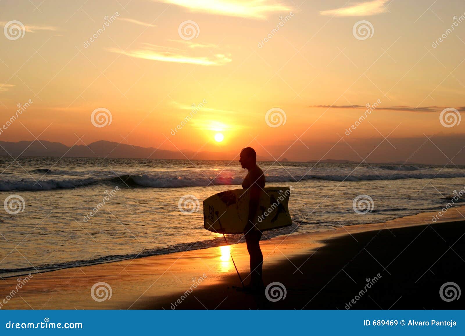 Surfer at the sunset stock image. Image of ocean, peaceful - 689469
